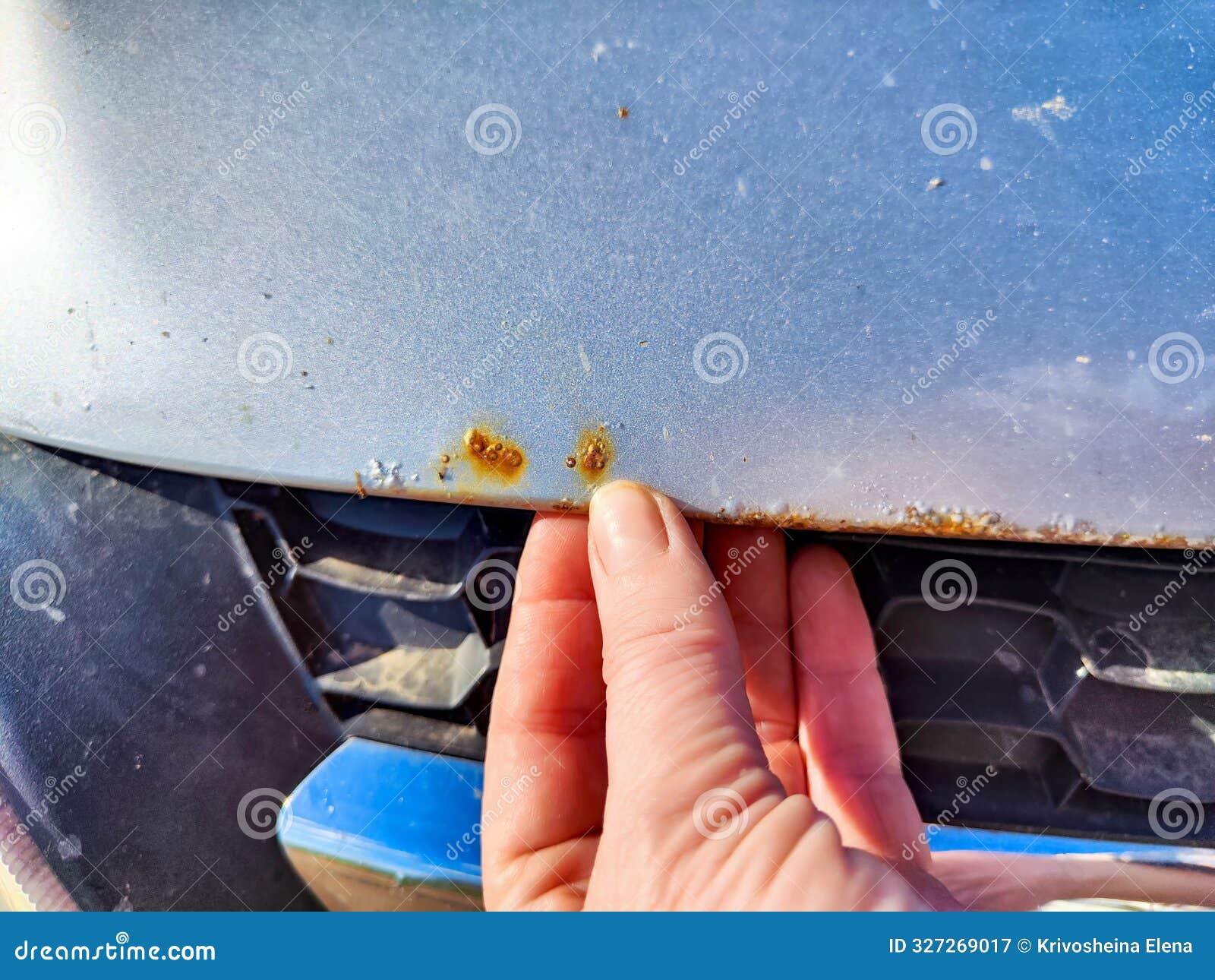 A Close Up Image Showing Rust Damage Along the Edge of a Car Hood Stock ...