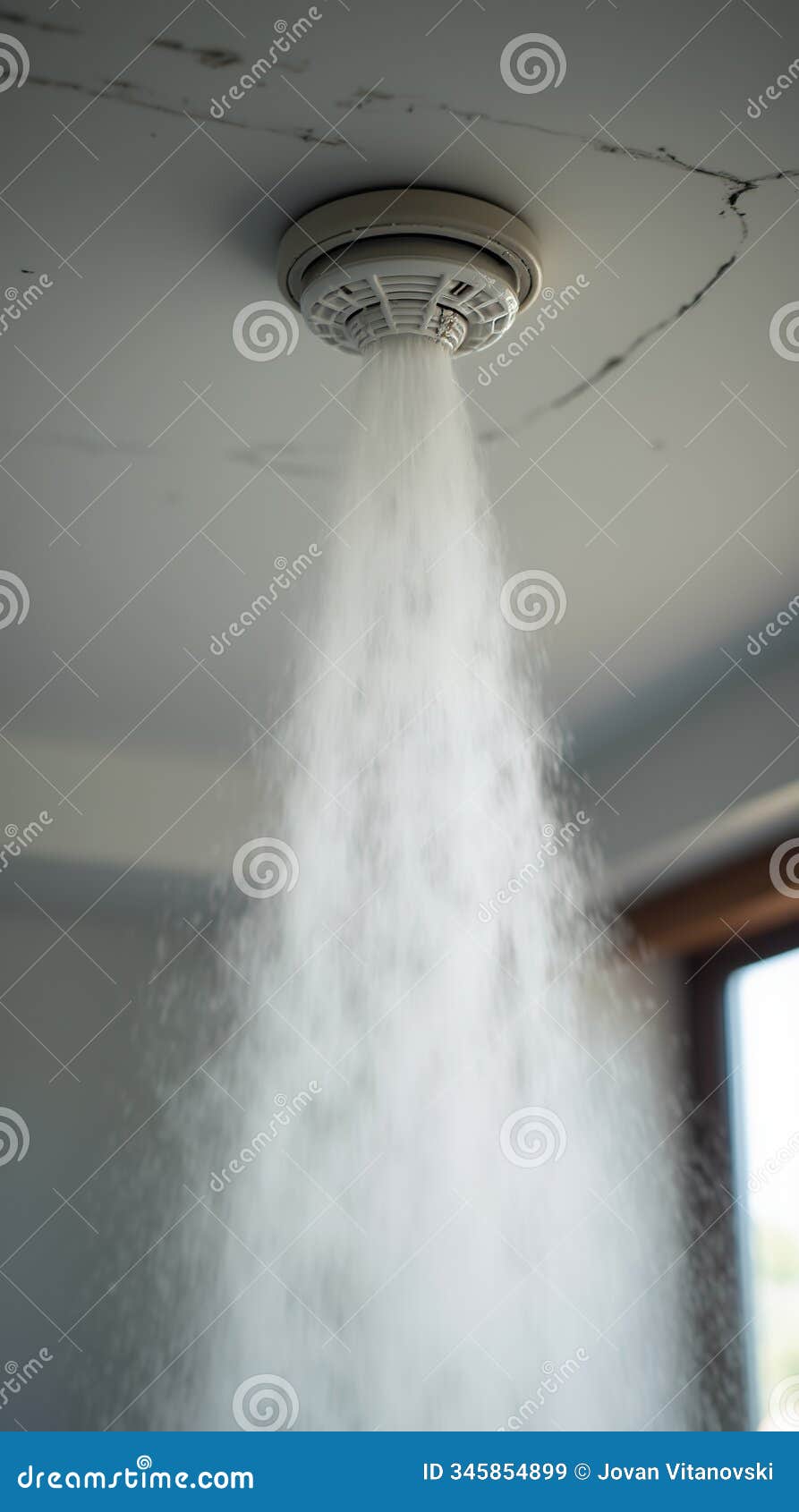 Close-Up of Indoor Fire Suppression System Activating in Ceiling Stock ...