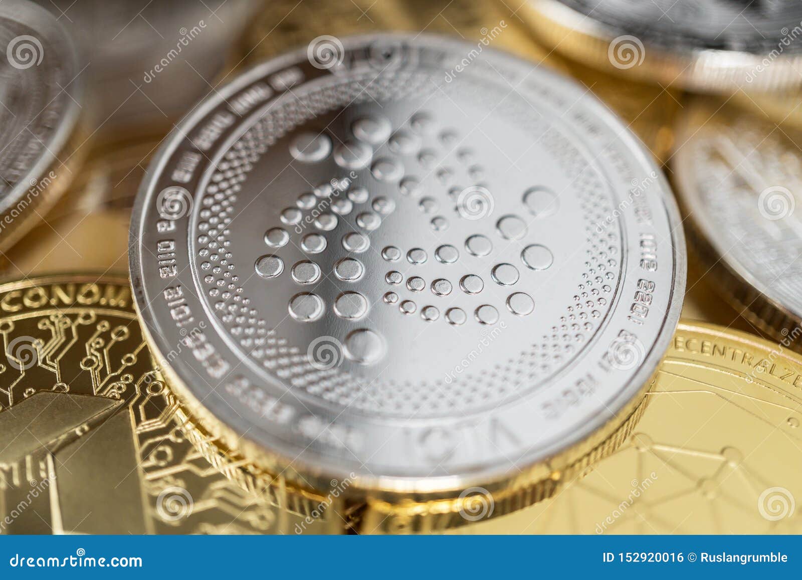 Close-up of Iota Physical Coin on Stack of Many Other Cryptocurrencies ...