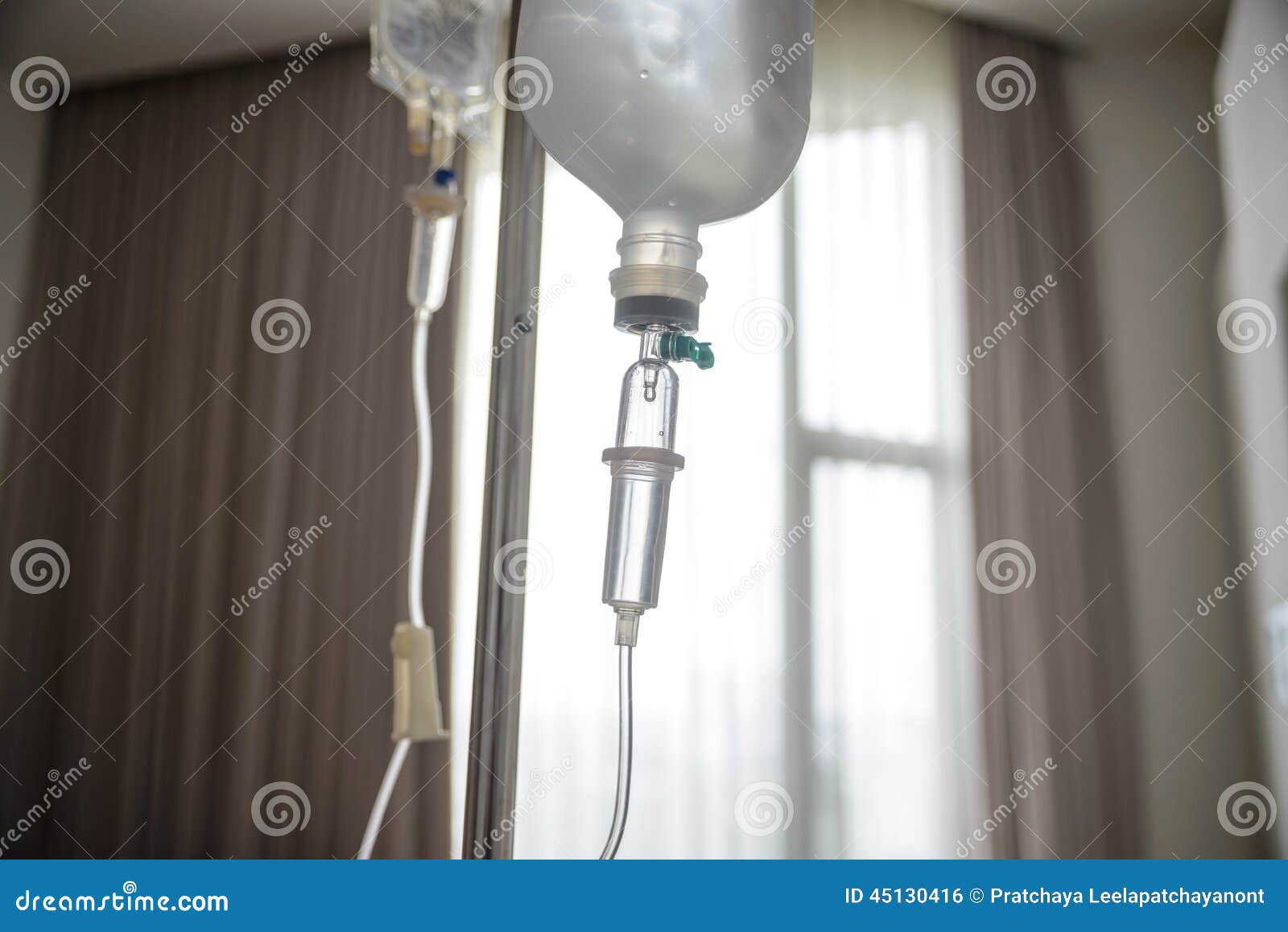 Close Up IV Saline Solution Drip for Patient Stock Photo - Image of ...