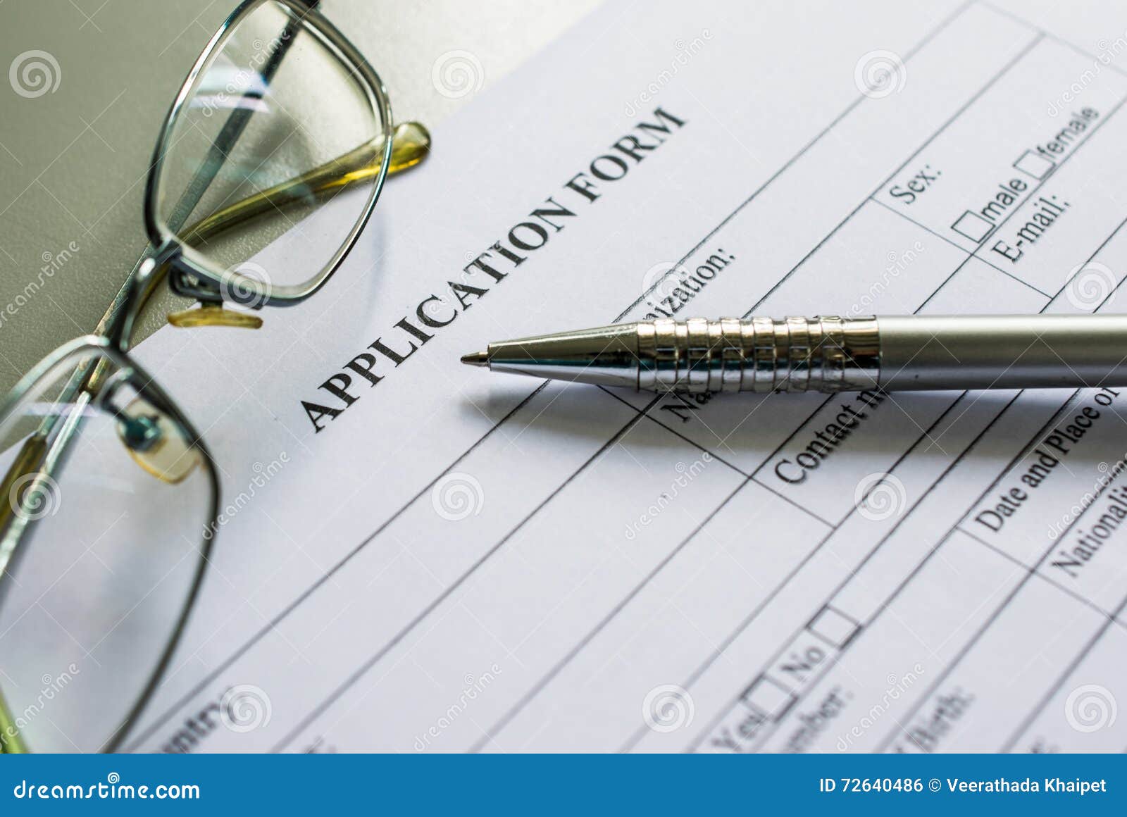 Close Up of a Job Application Form on Desk with Pen and Glasses Stock ...