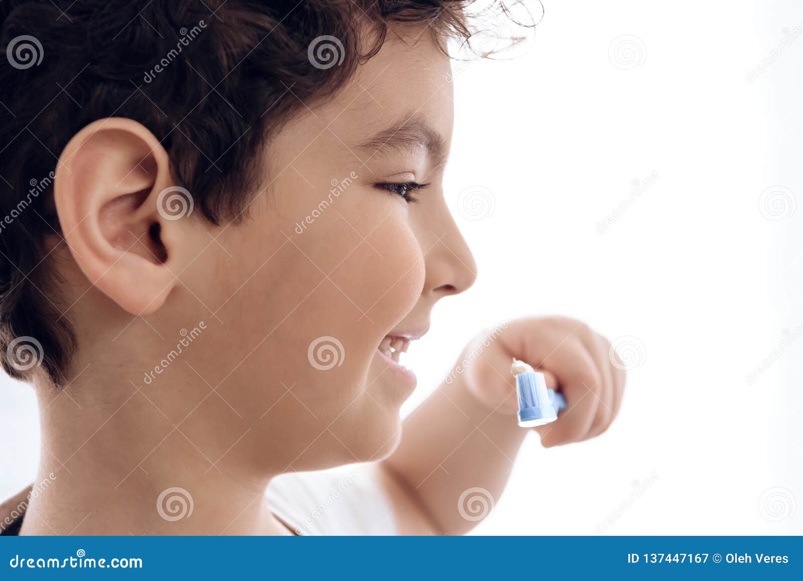 Close Up. Joyful Boy Brushes Teeth with Toothpaste on White Background ...