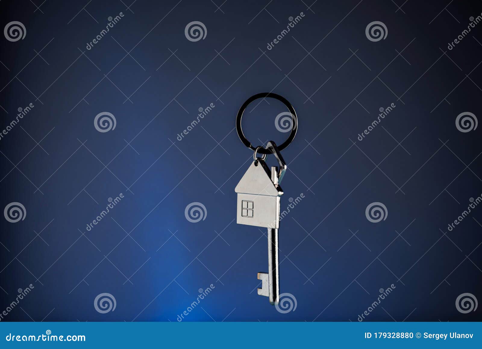 A Close Up of a Key on Blue Background Stock Photo - Image of large ...