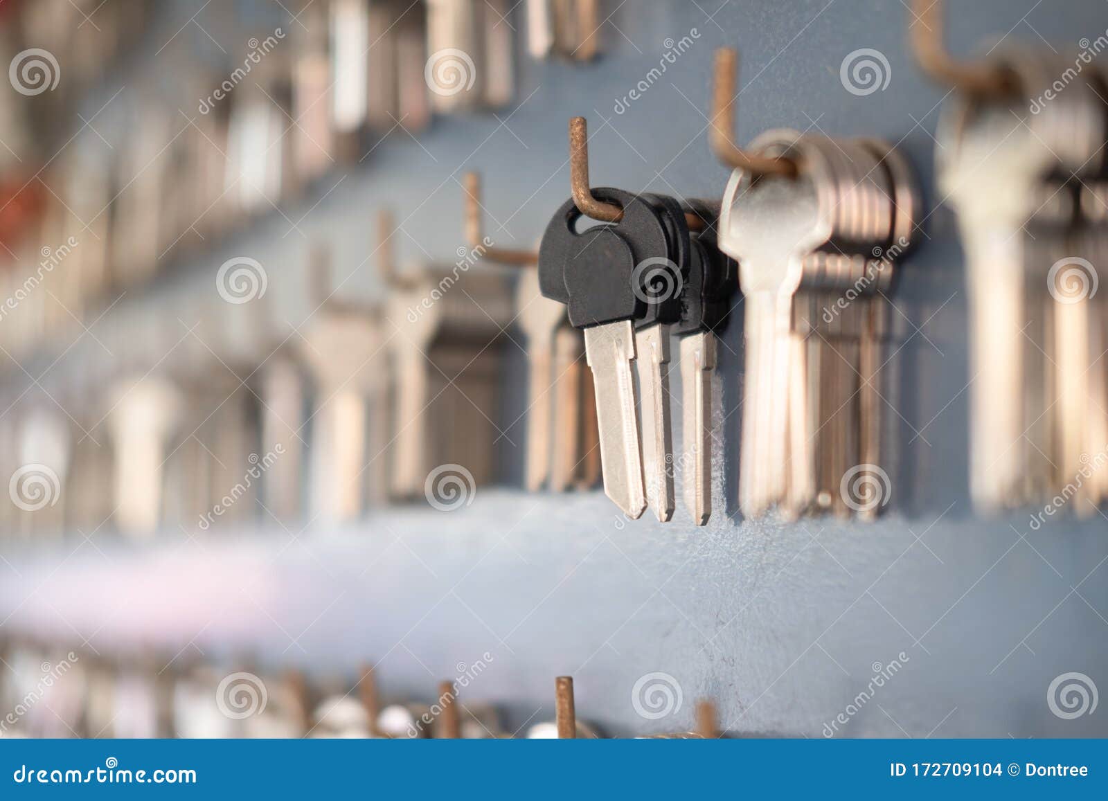Close Up of Key Hanging on Wall in Key Maker Shop Stock Photo - Image ...
