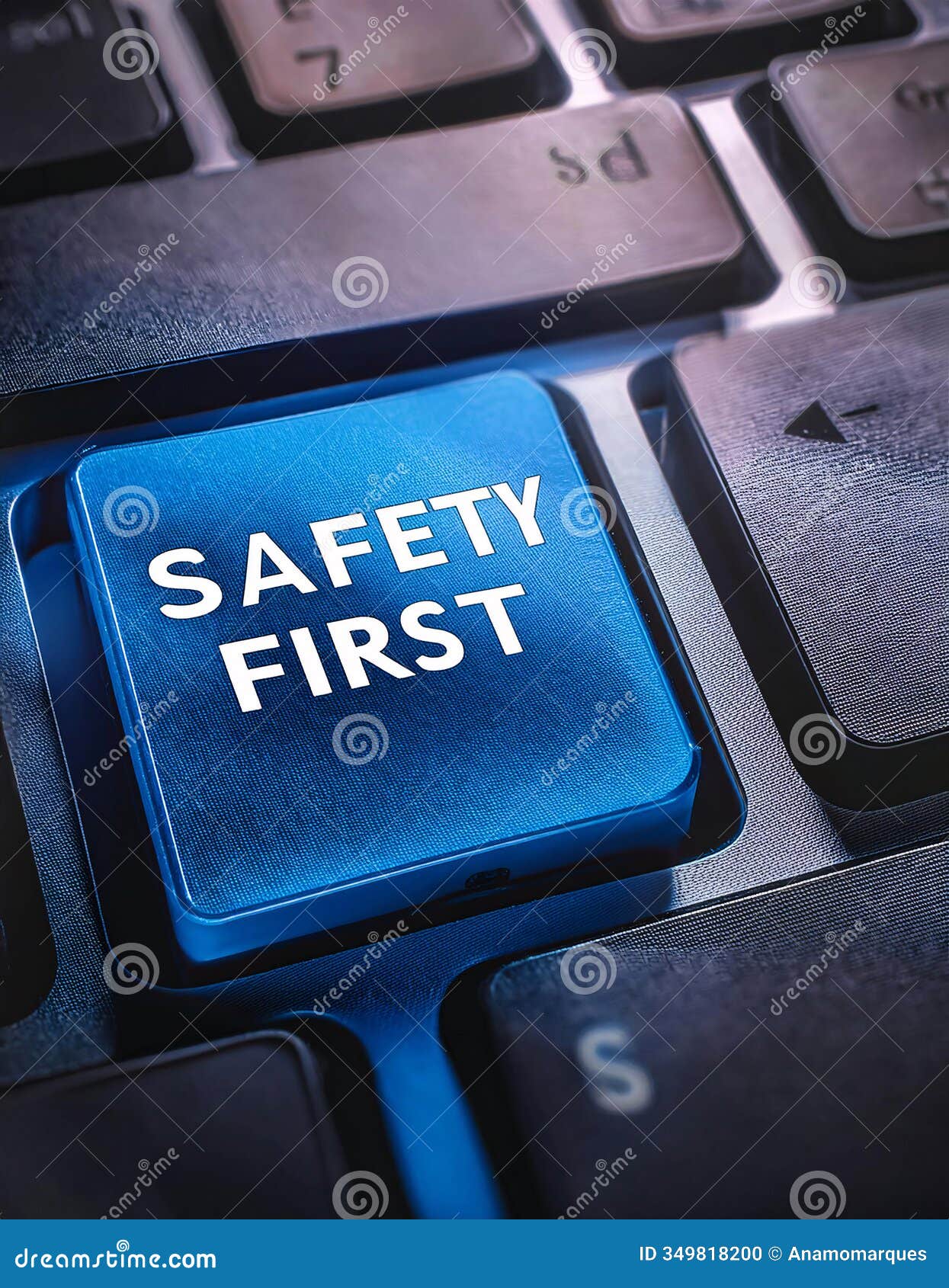A Close-up of a Keyboard with a Blue Key Labeled Safety First in White ...