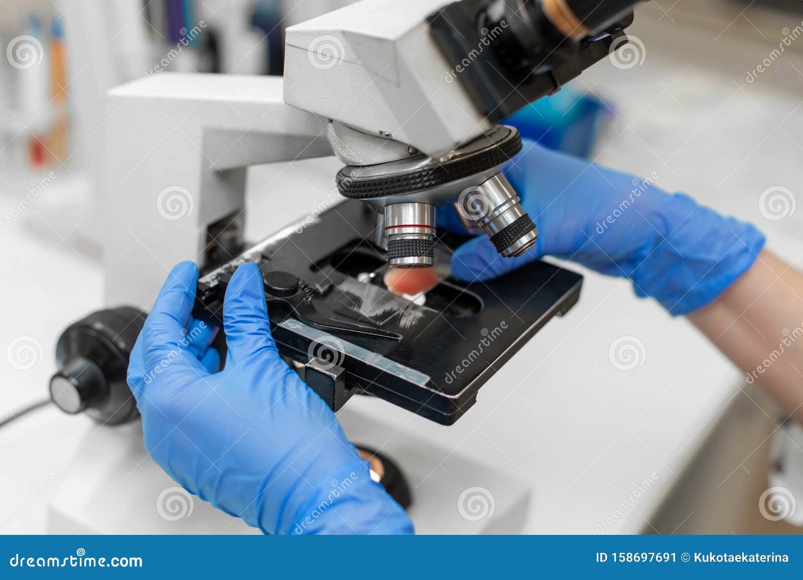 Close Up Lab Technician Research Blood Sample in Microscope Stock Image ...