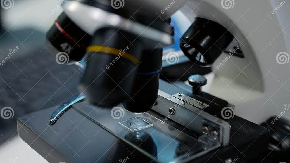 Close Up of Laboratory Microscope with Tray for Fluid Sample Research ...