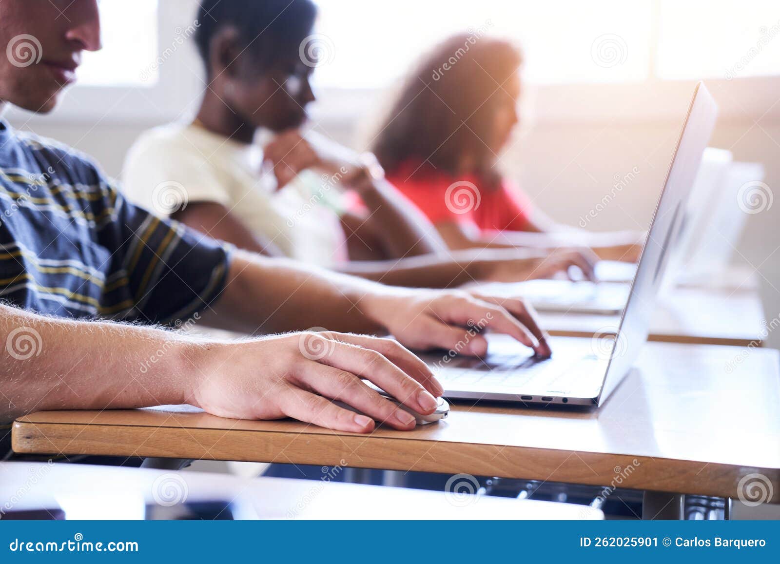 Close-up of the Laptop in the Classroom. a Multi-ethnic Group of High ...
