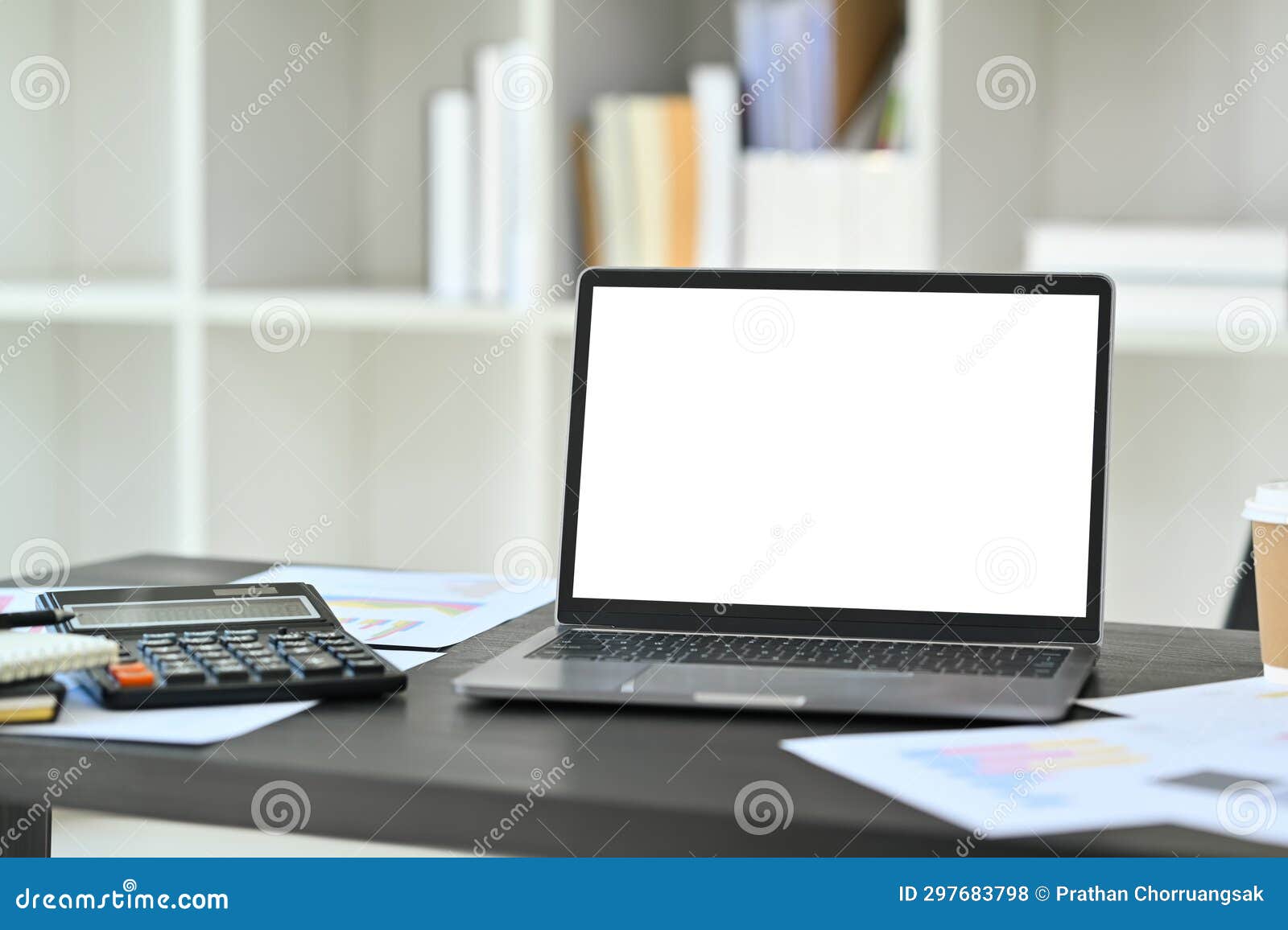 Close Up Laptop Computer with White Screen, Calculator and Financial ...