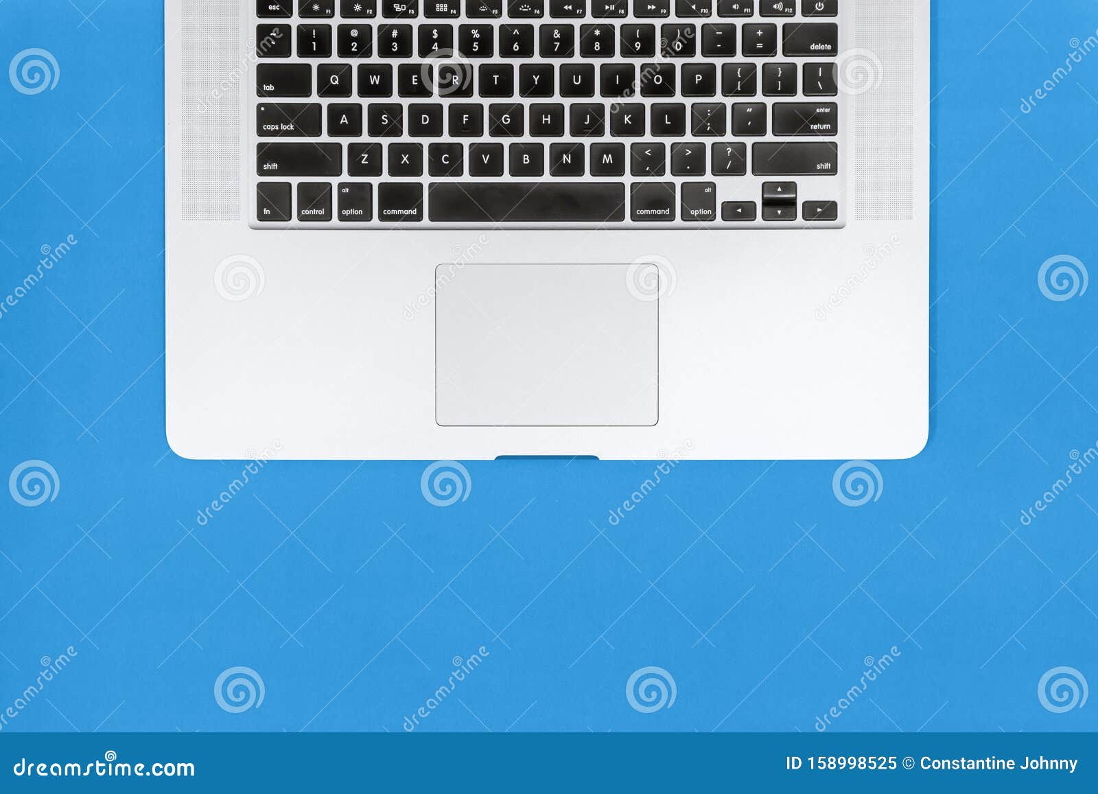 Close Up of Laptop Keyboard on Blue Background Stock Image - Image of ...