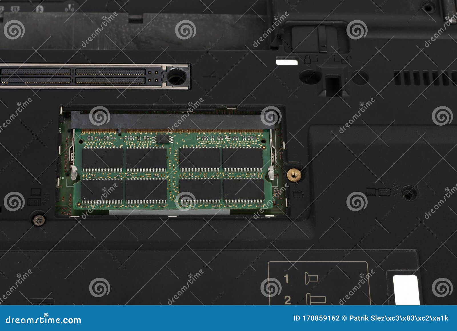 Close Up Of Laptop Memory Module On Slot Of Motherboard. Underside Of ...