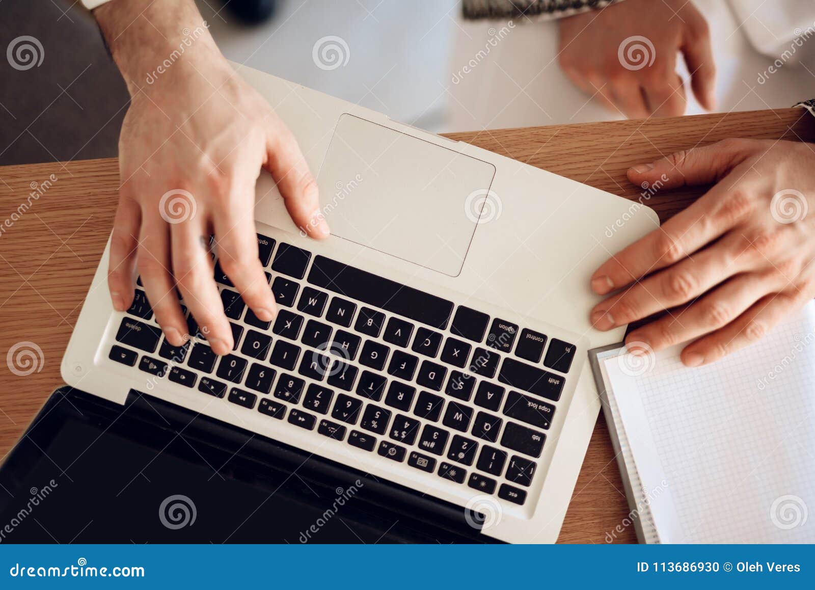 Close Up Laptop on the Table with Three Hands. Stock Photo - Image of ...