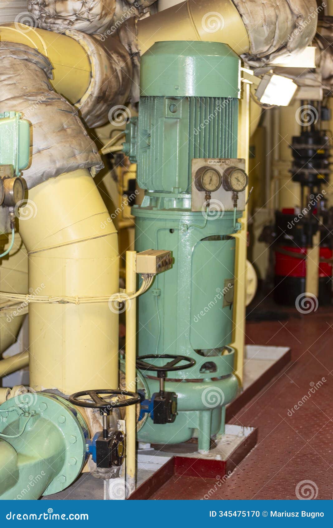 A Close-up of a Large Cooling Water Pump in the Engine Room of a Cargo ...