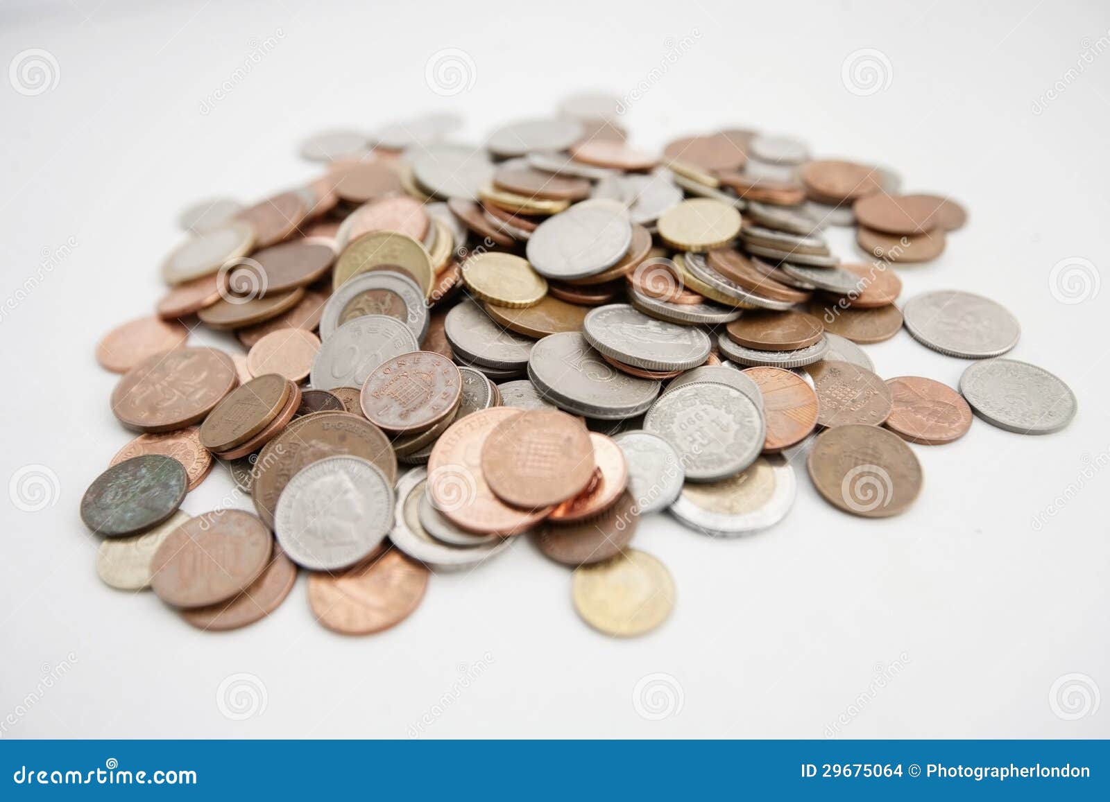 Close-up of Large Group of Coins Over White Background Stock Photo ...