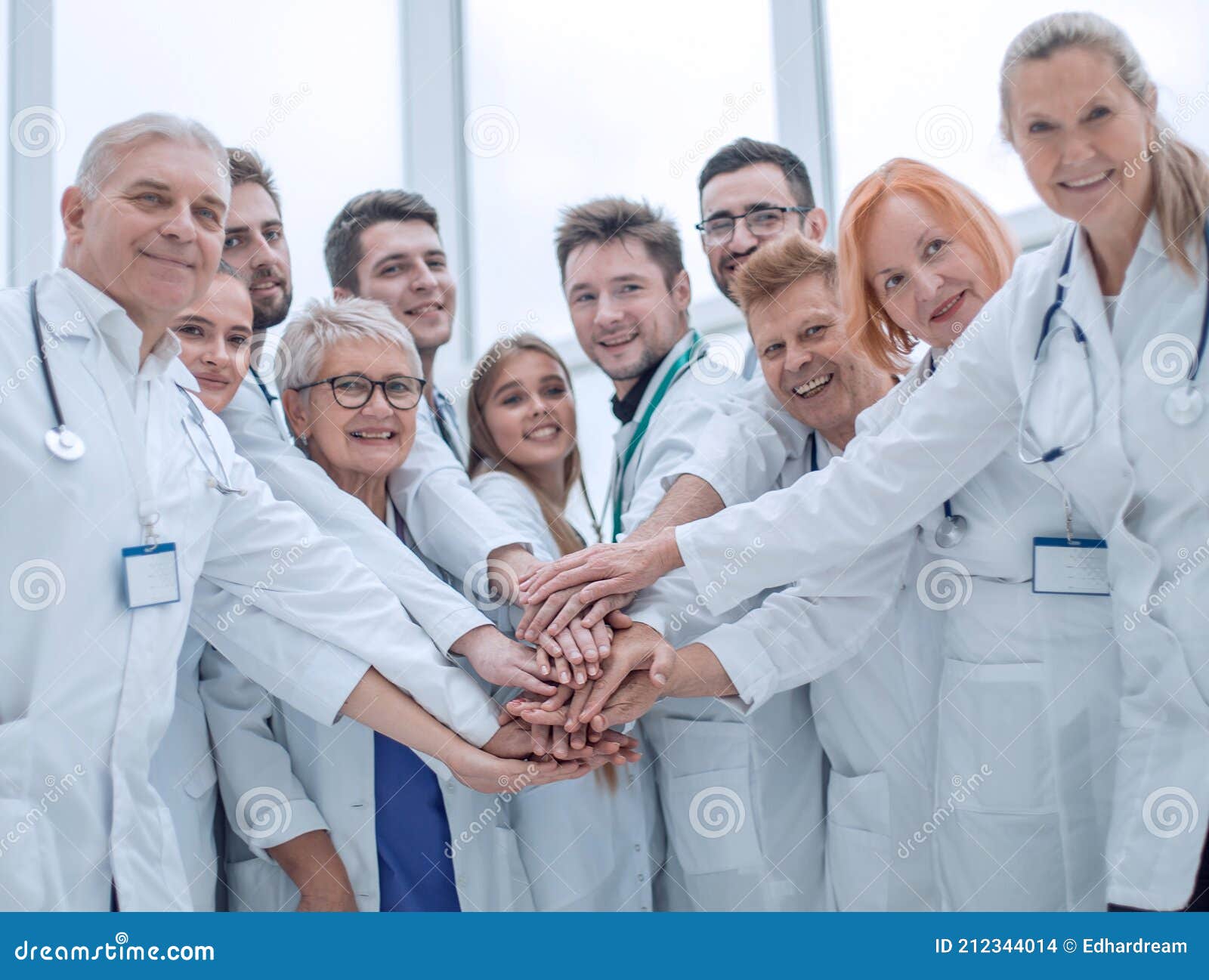 Large Group of Doctors Put Their Hands Together. Stock Photo - Image of ... Large Group of Doctors Put Their Hands Together. Stock Photo - Image of ...