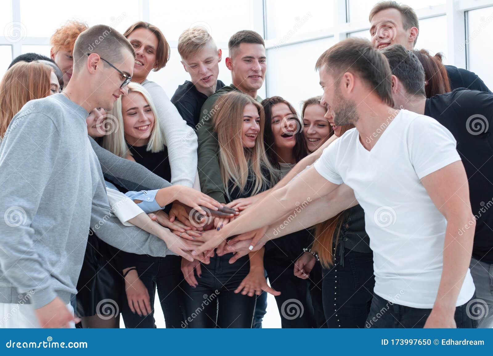 Large Group of Young People Joining Their Hands Together. Stock Photo ... Large Group of Young People Joining Their Hands Together. Stock Photo ...