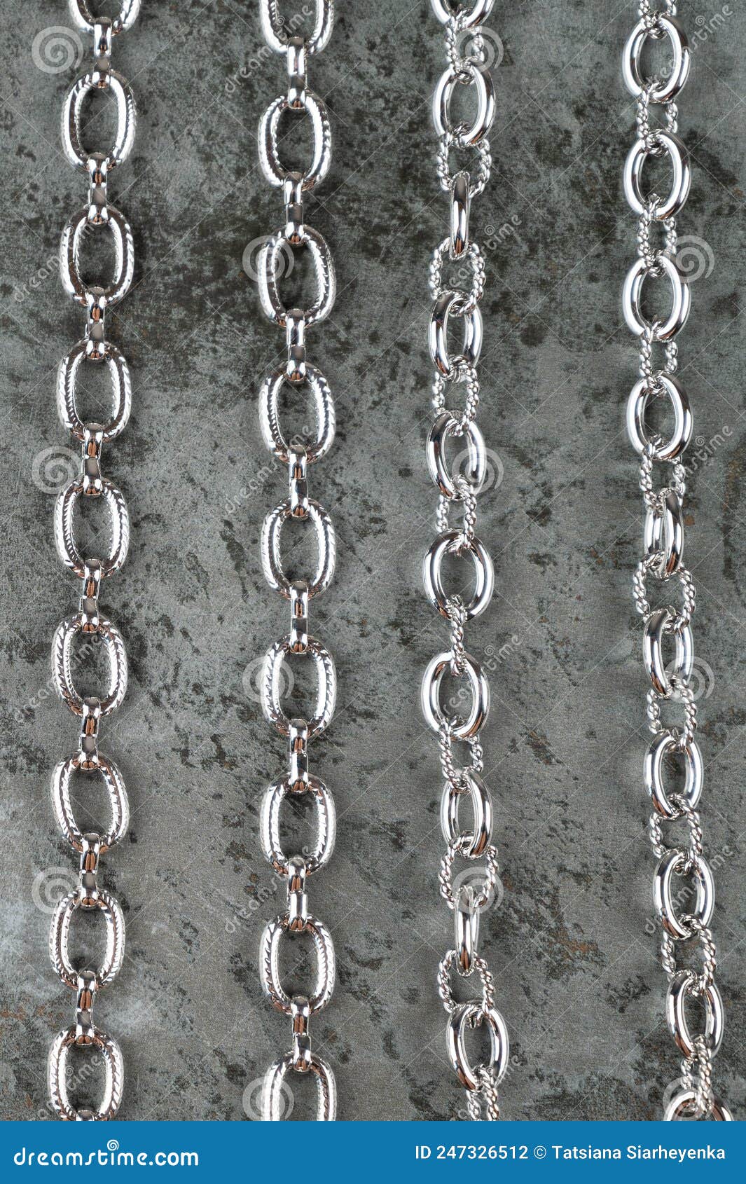 Close Up of Large Shiny Metalic Silver Chains on Gray Texture ...
