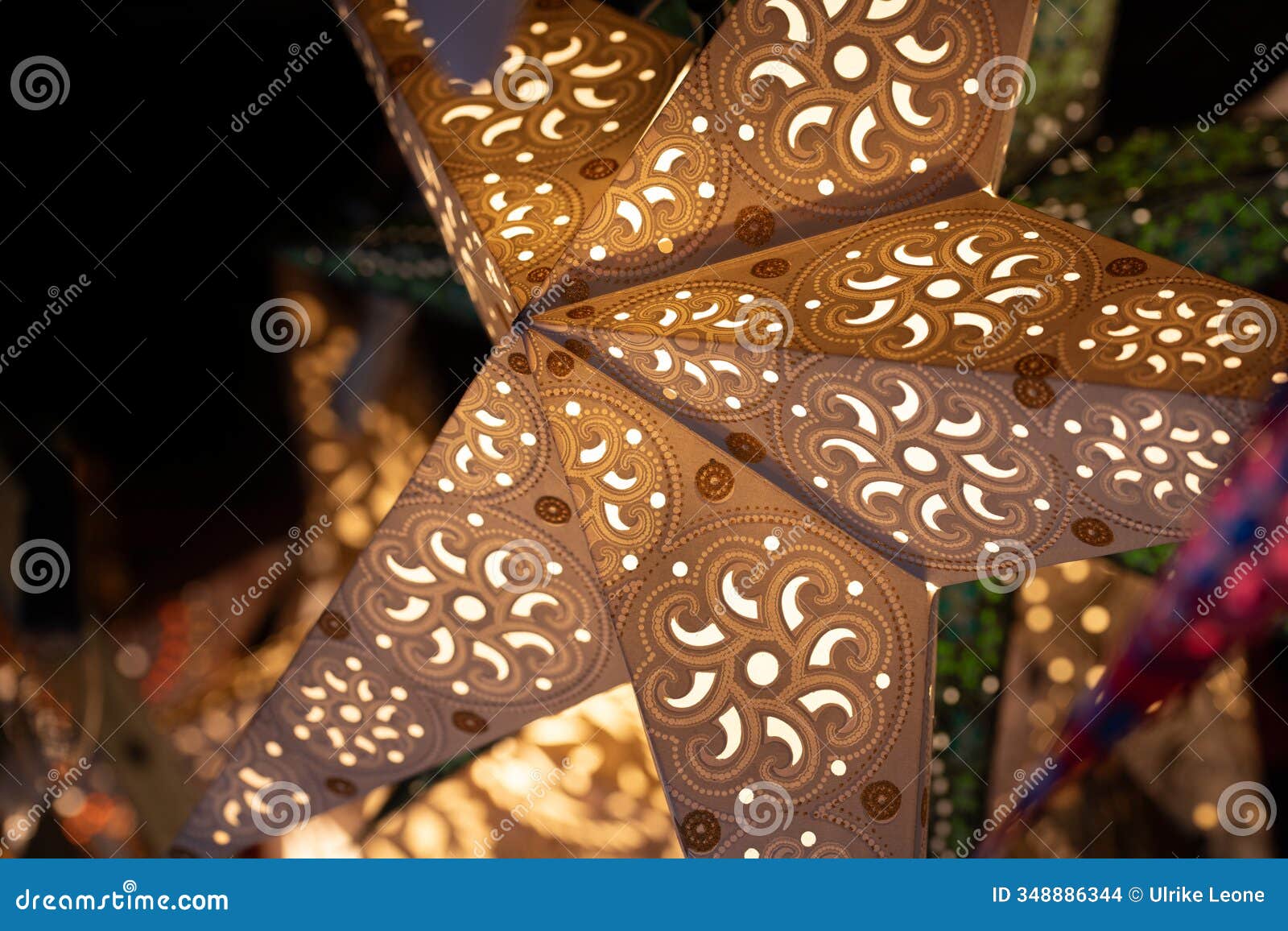 Close-up of a Large Star Illuminated from the Inside. the Star Hangs in ...