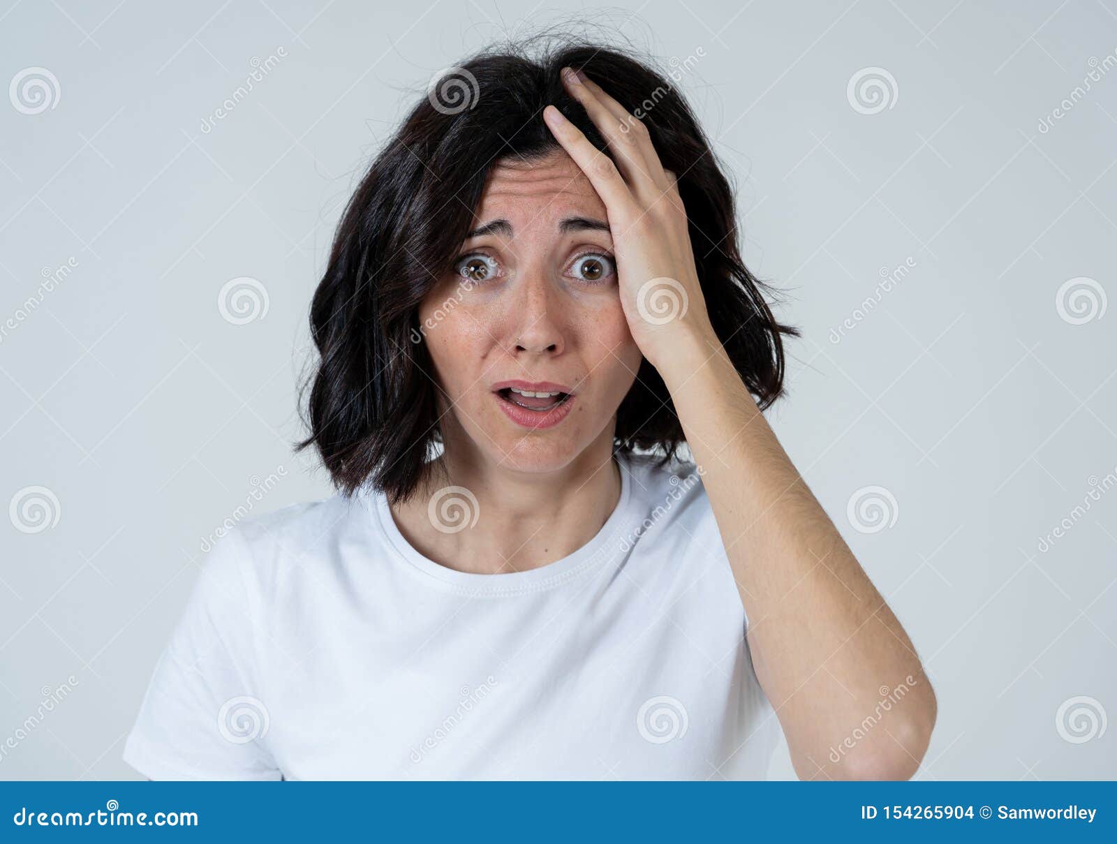 Portrait Of A Young Attractive Woman Looking Scared And Shocked Human