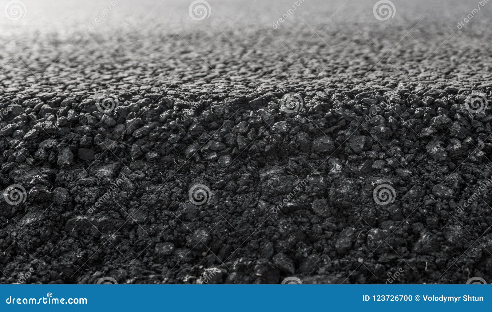 Close-up on a Layer of New Asphalt at the Road Under Construction ...