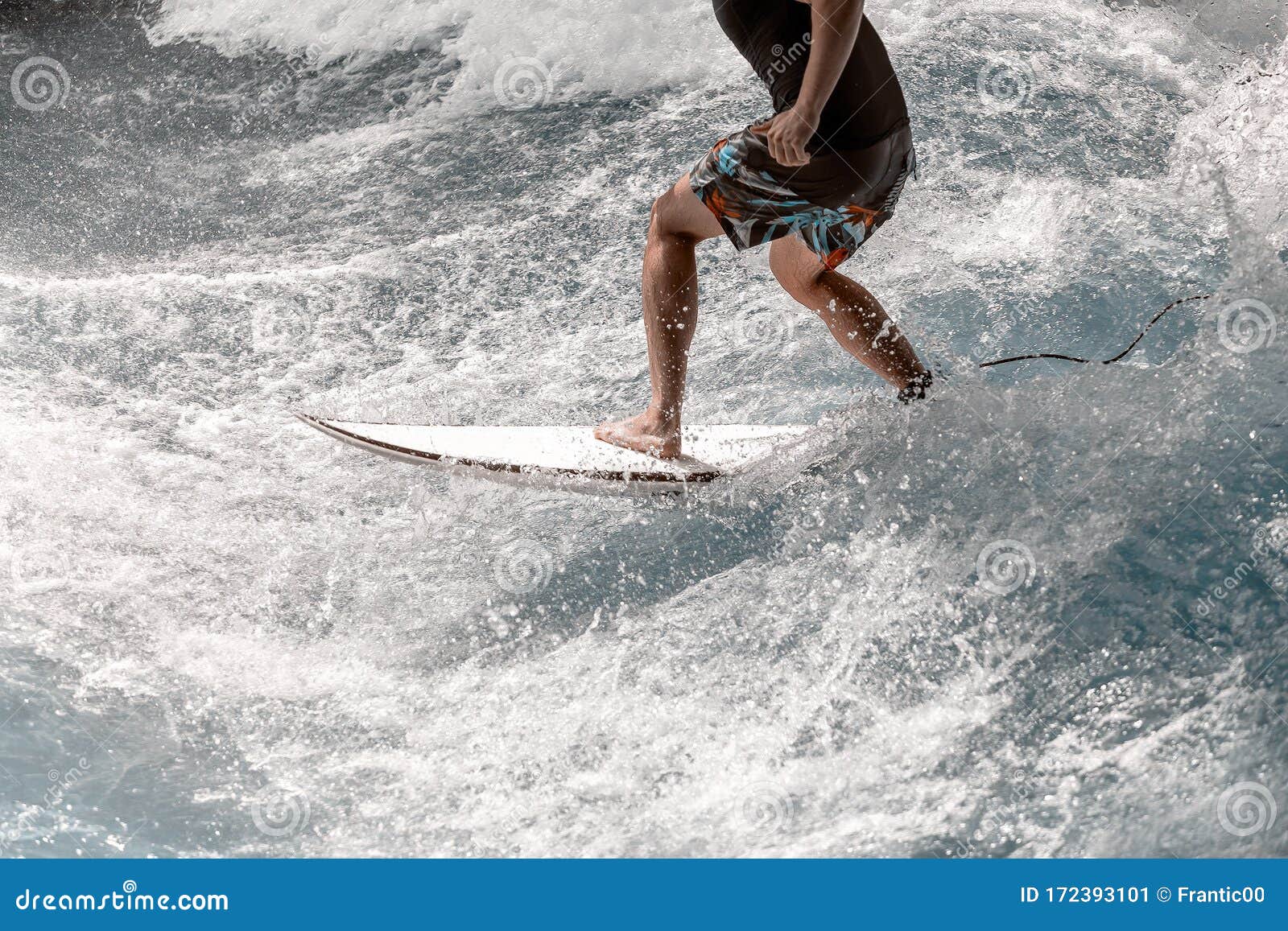 Legs of an Athlete Surfing on the Sea Waves Stock Image - Image of ...