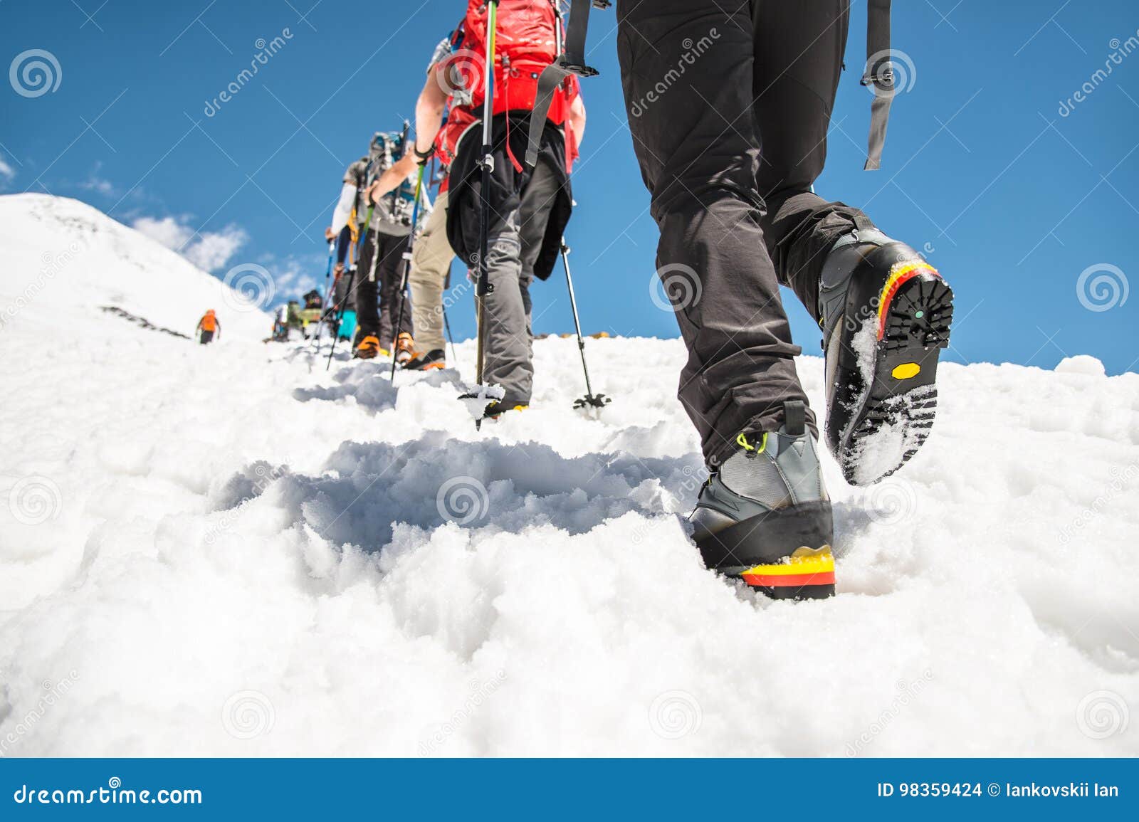 Close-up of the Legs of a Group Going Uphill Stock Photo - Image of ...