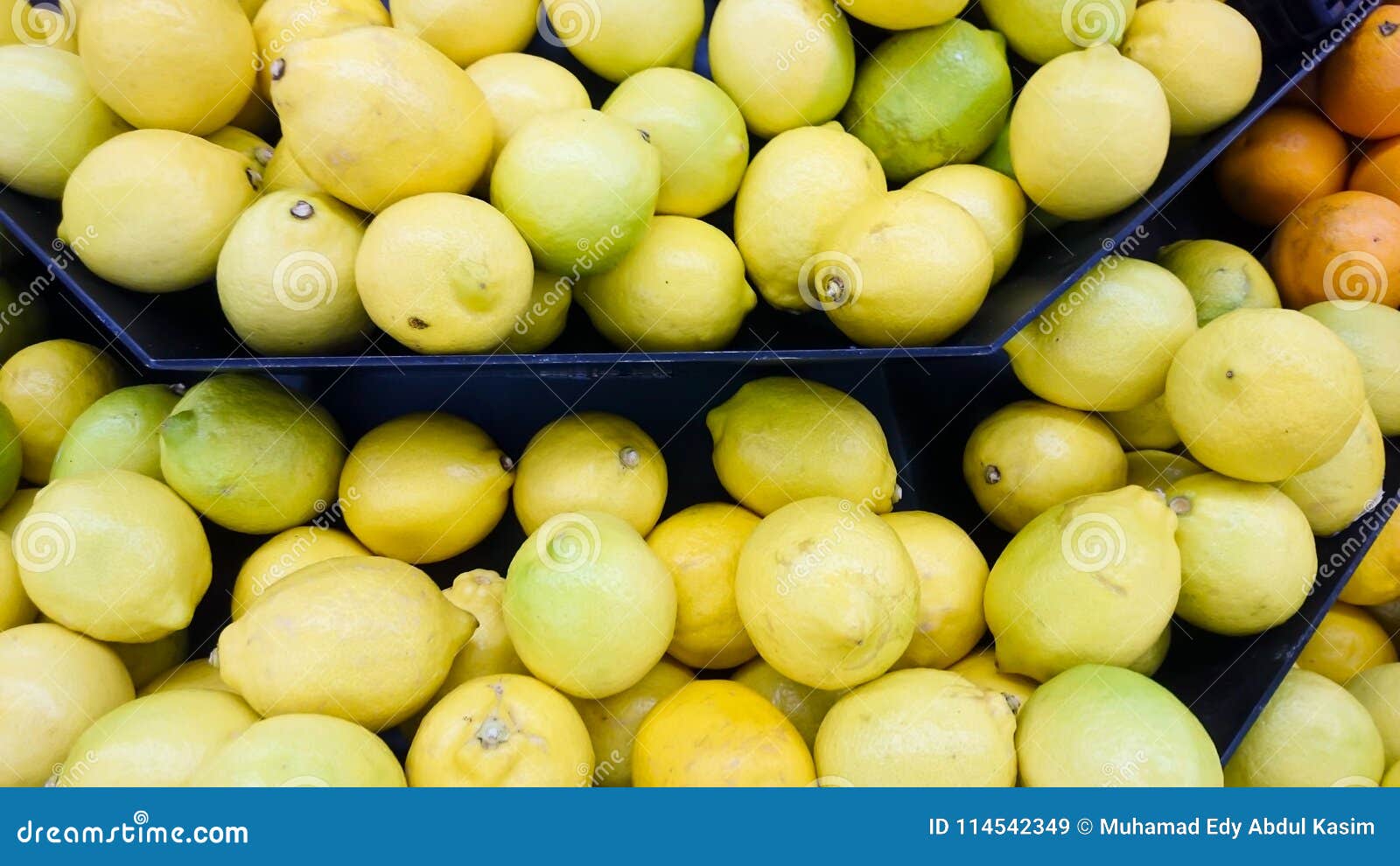 Lemon in display at market stock image. Image of organic - 114542349
