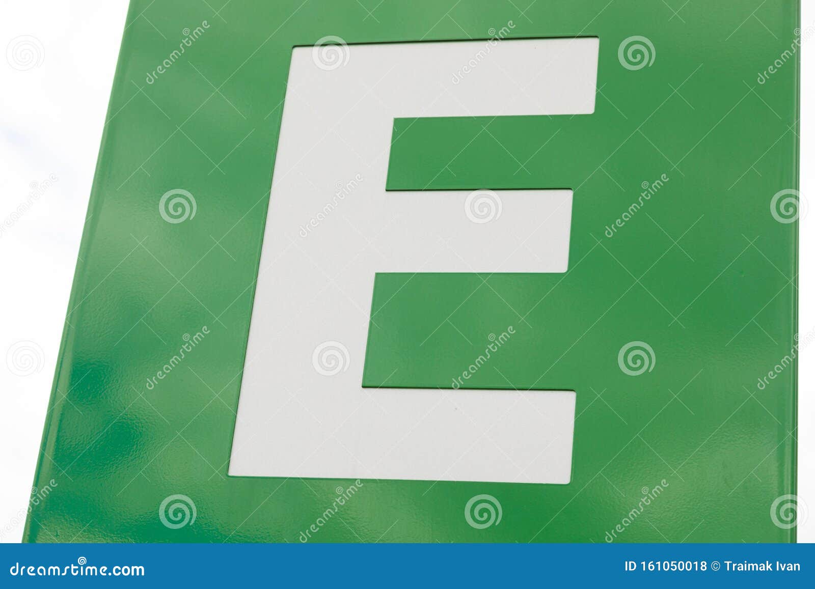 Close-up of Letter E on Green Square Tablet Stock Photo - Image of ...