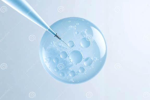 Close-up of a Syringe Interacting with a Stem Cell Under a Microscope ...