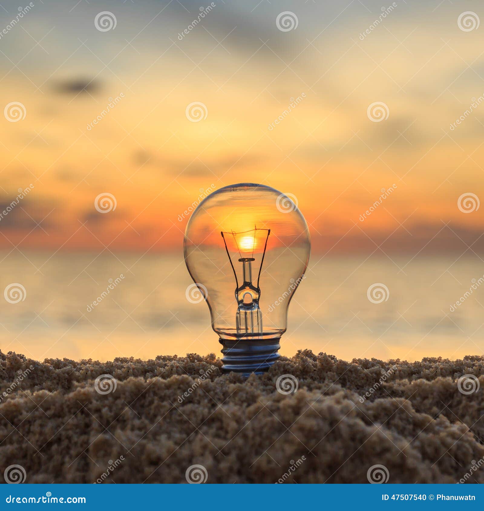 Close Up Light Bulb on Sunset Beach Stock Photo - Image of technology ...