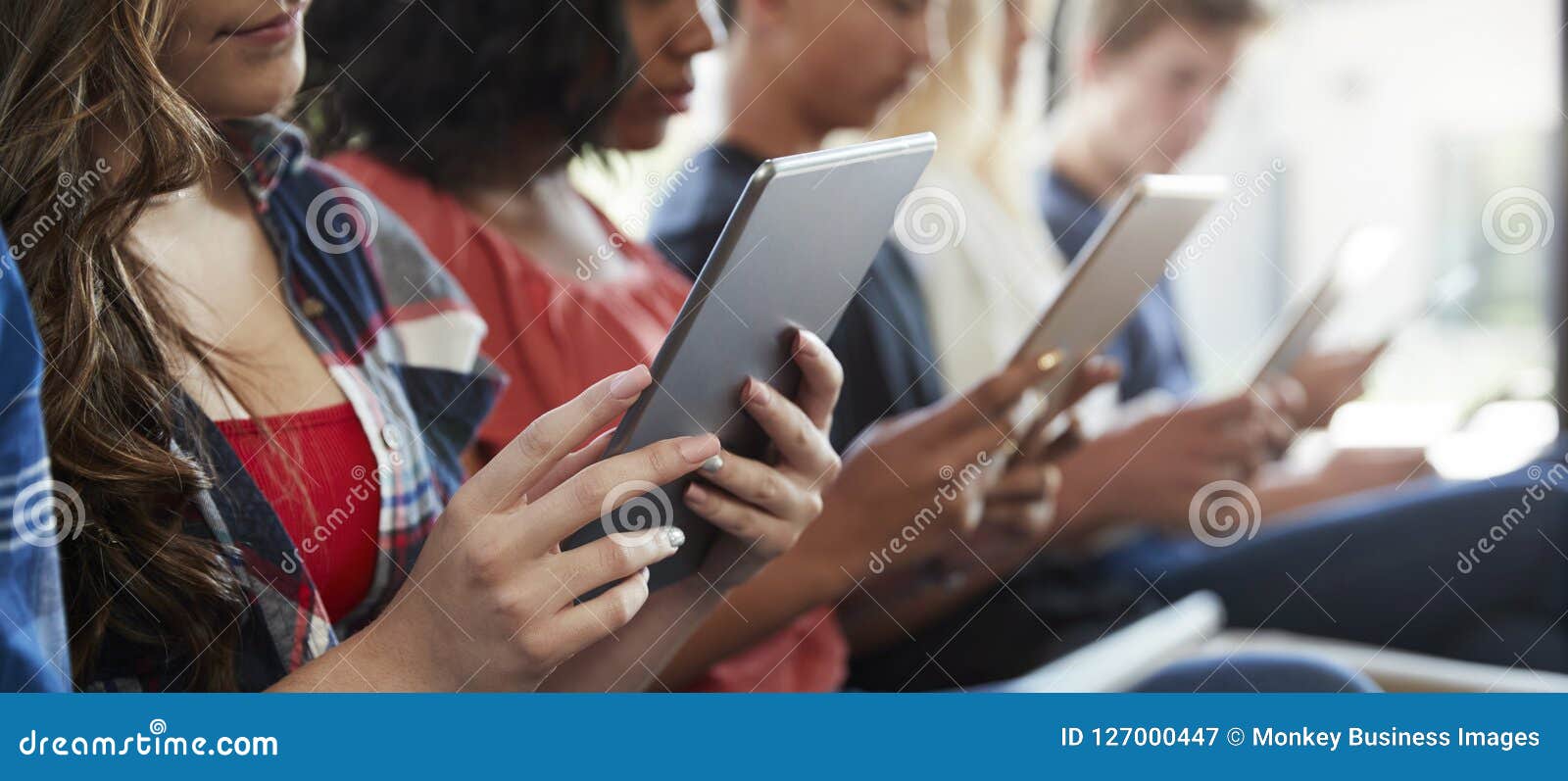 Close Up of a Line of High School Students Using Digital Tablets Stock ...