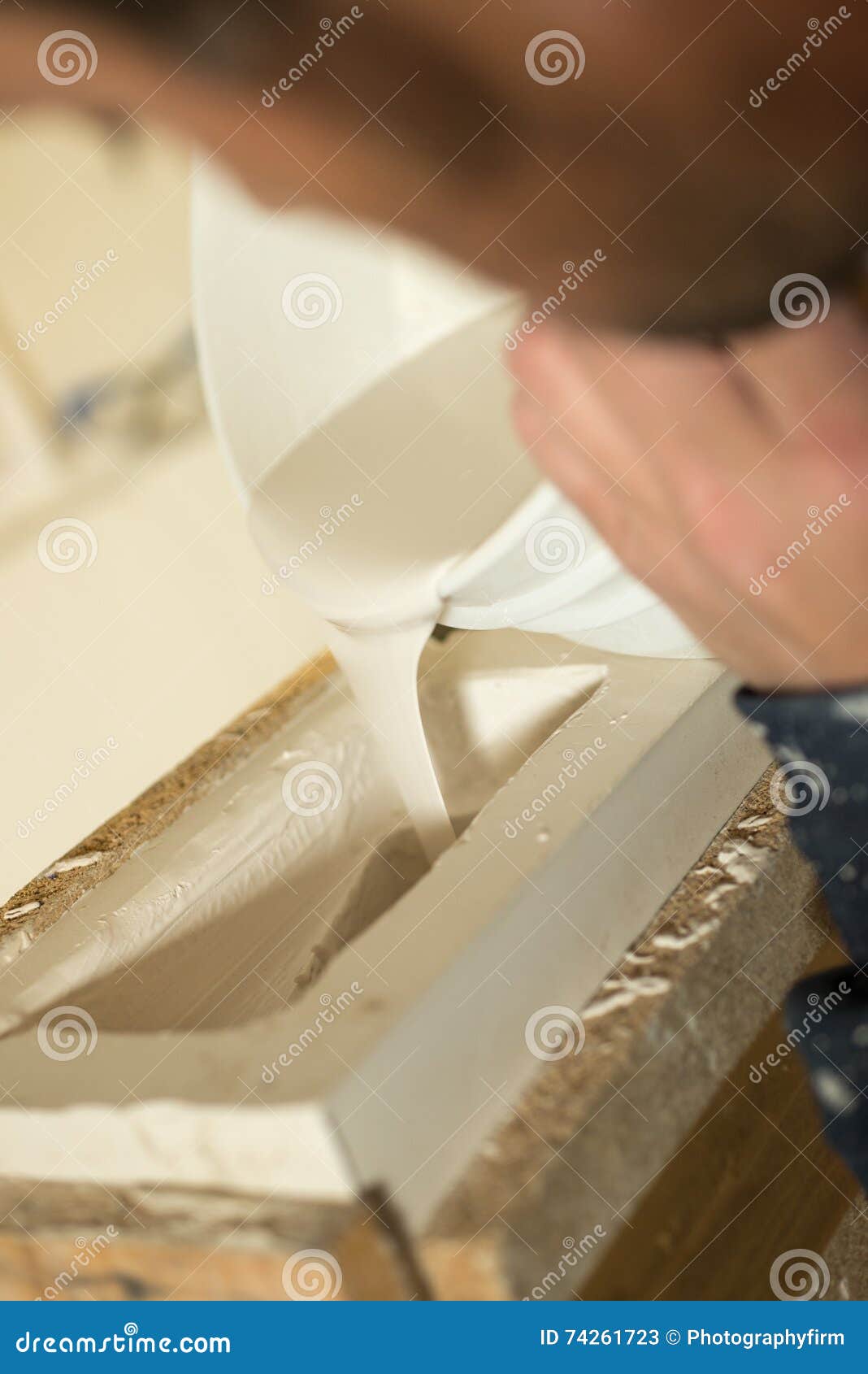 Close Up of Liquid Plaster Flowing into Mold Stock Image - Image of ...