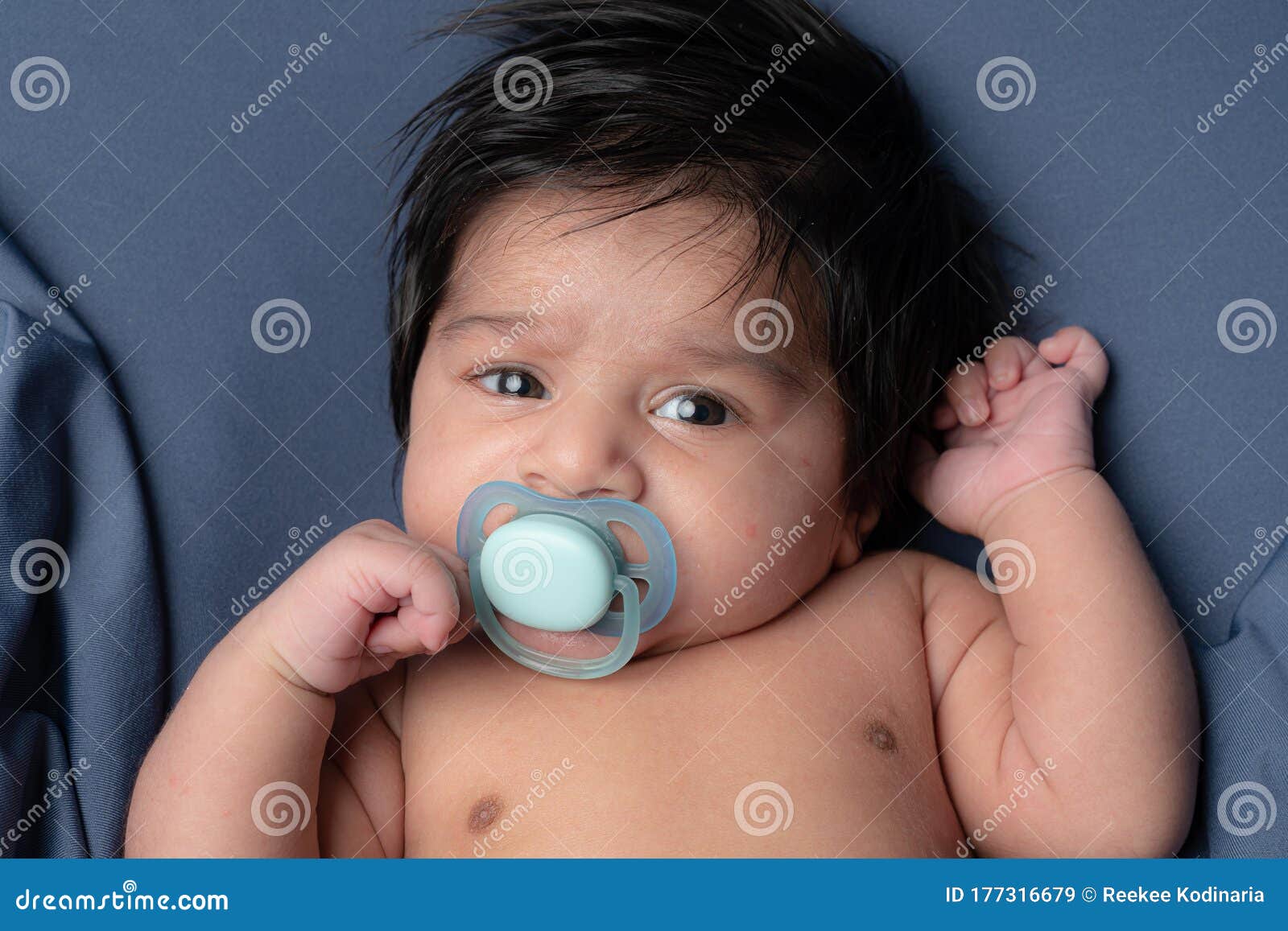 Close Up of Little Beautiful Baby with a Pacifier Stock Image - Image ...