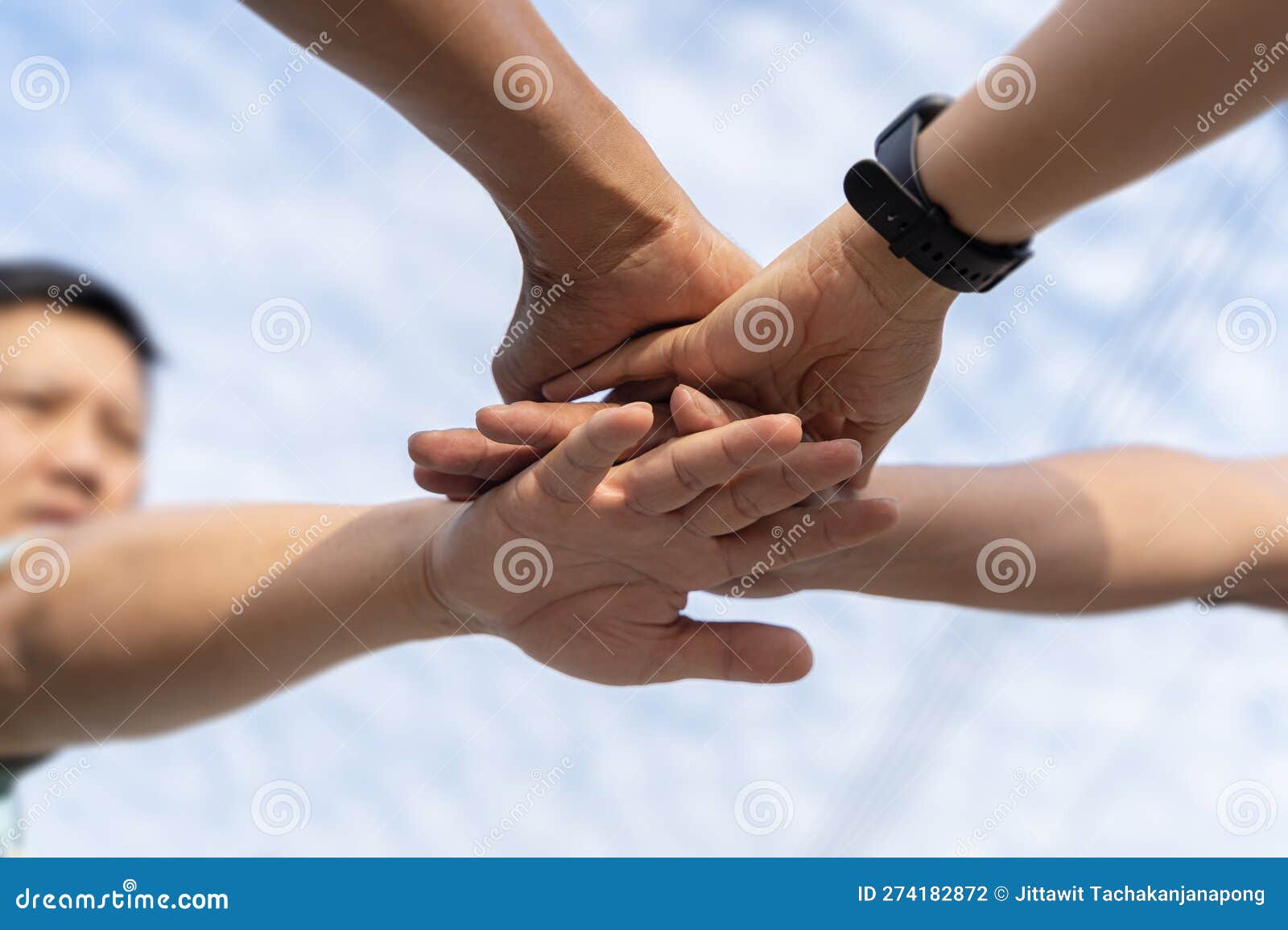 Close Up Low Angle of Business People Putting Their Hands Together ...