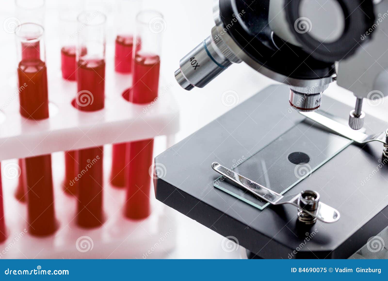 Close Up Macro Microscope with Blood Sample on White Background Stock ...