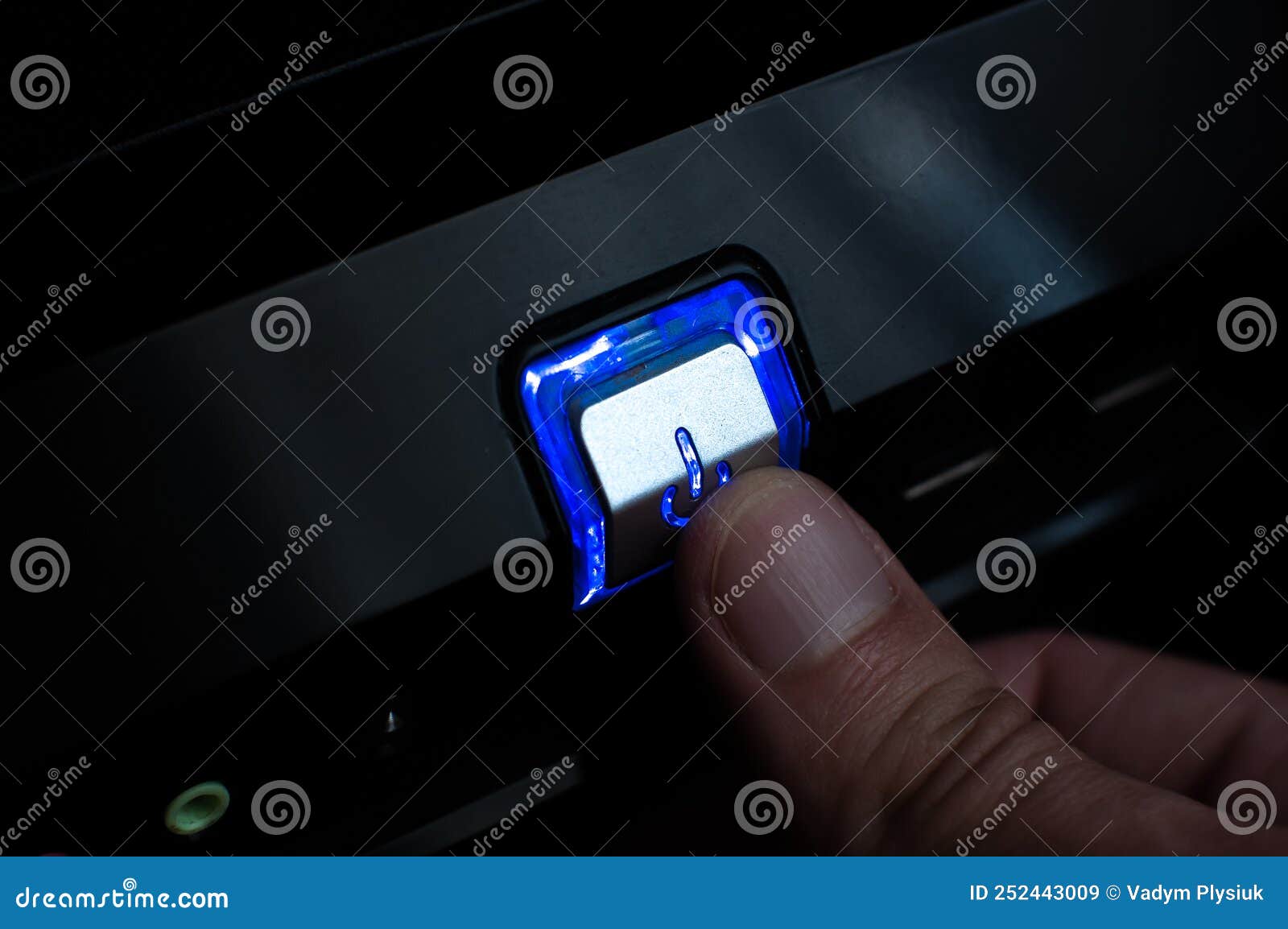 Close Up Macro Shot of the Press the Power Button on Computer. Turn on ...