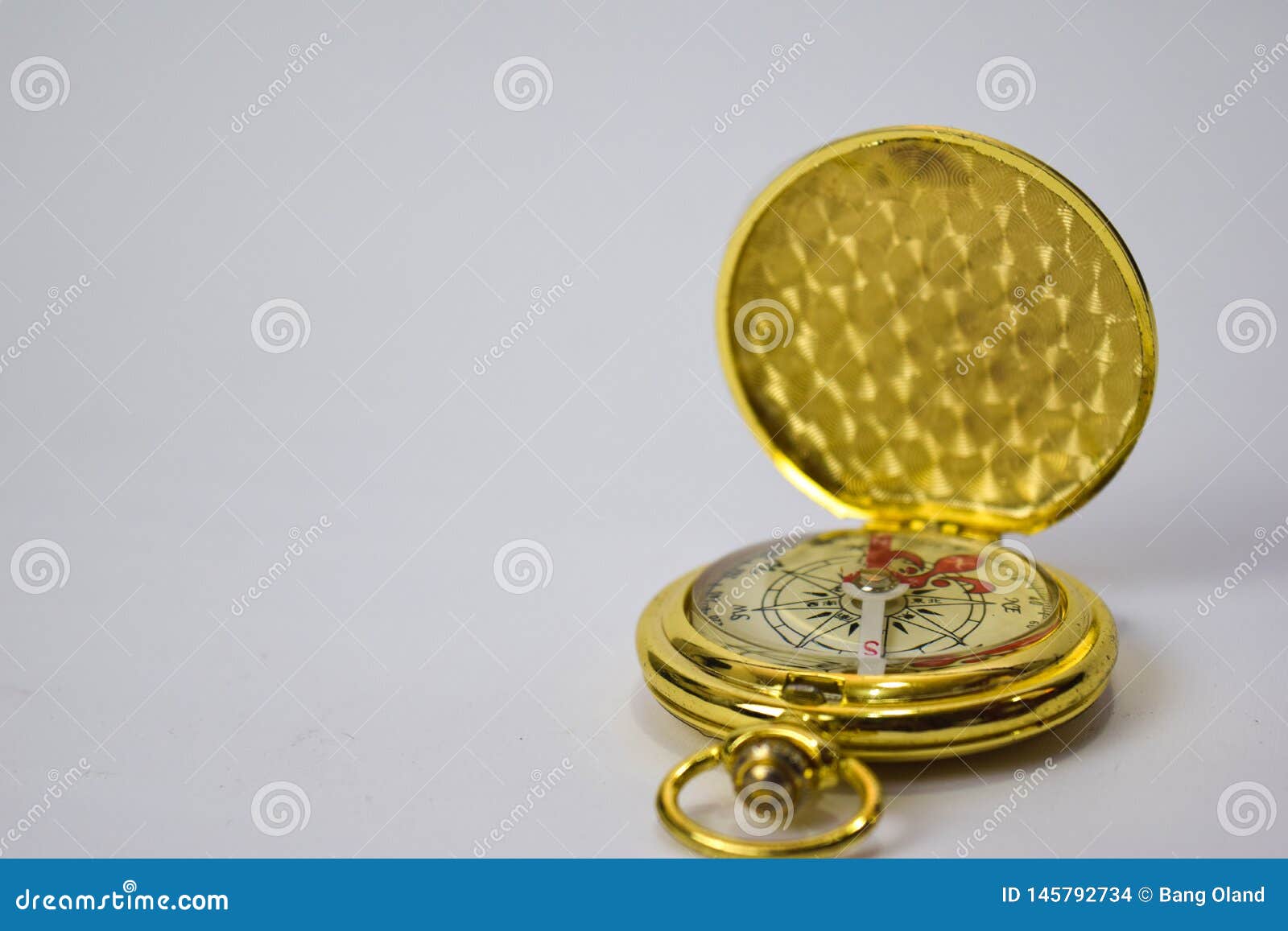 Close Up Magnetic Golden Compass Isolated on White Background Stock ...