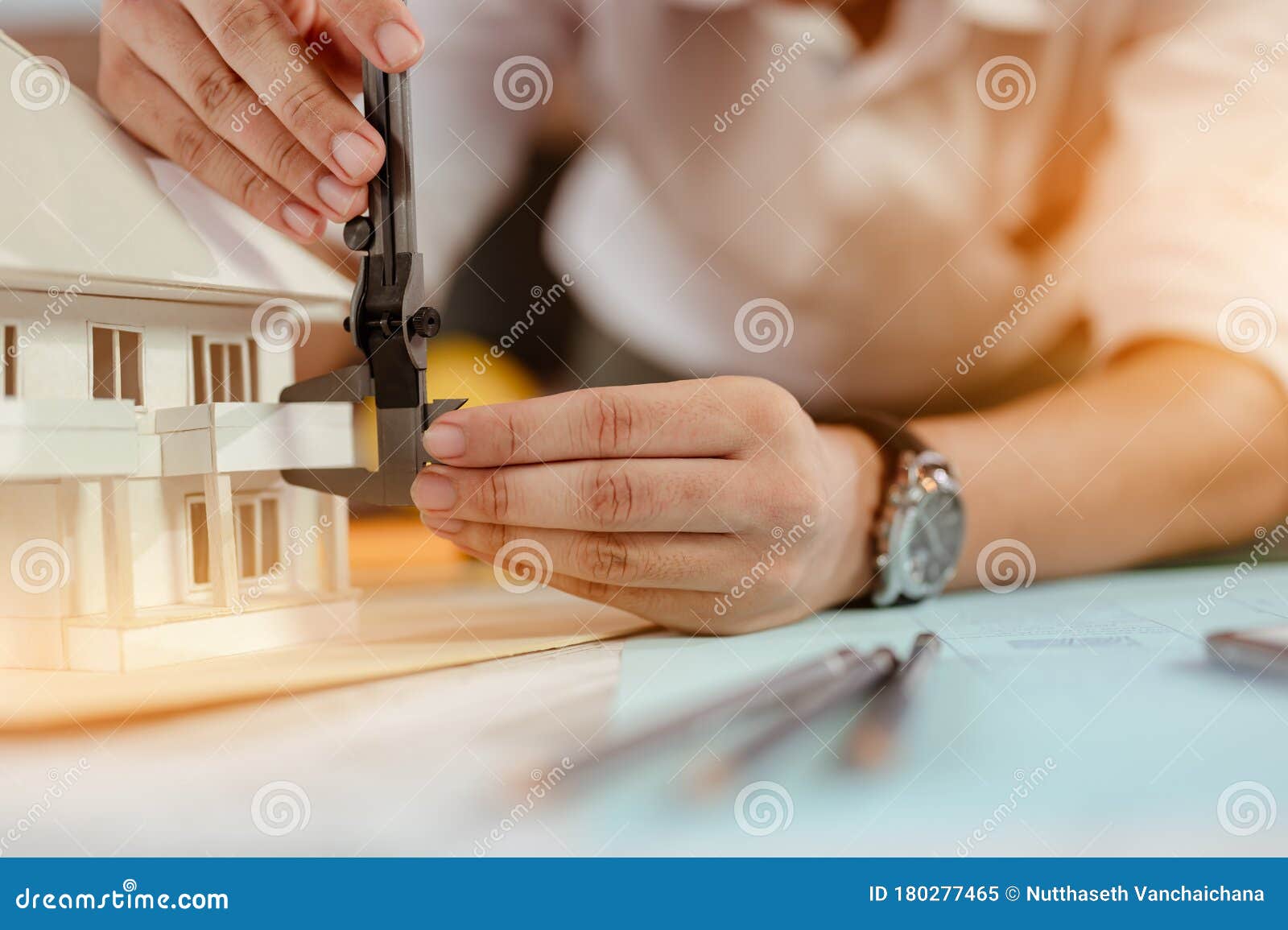 Close Up of Male Architect Hands Measuring and Making Model House on ...