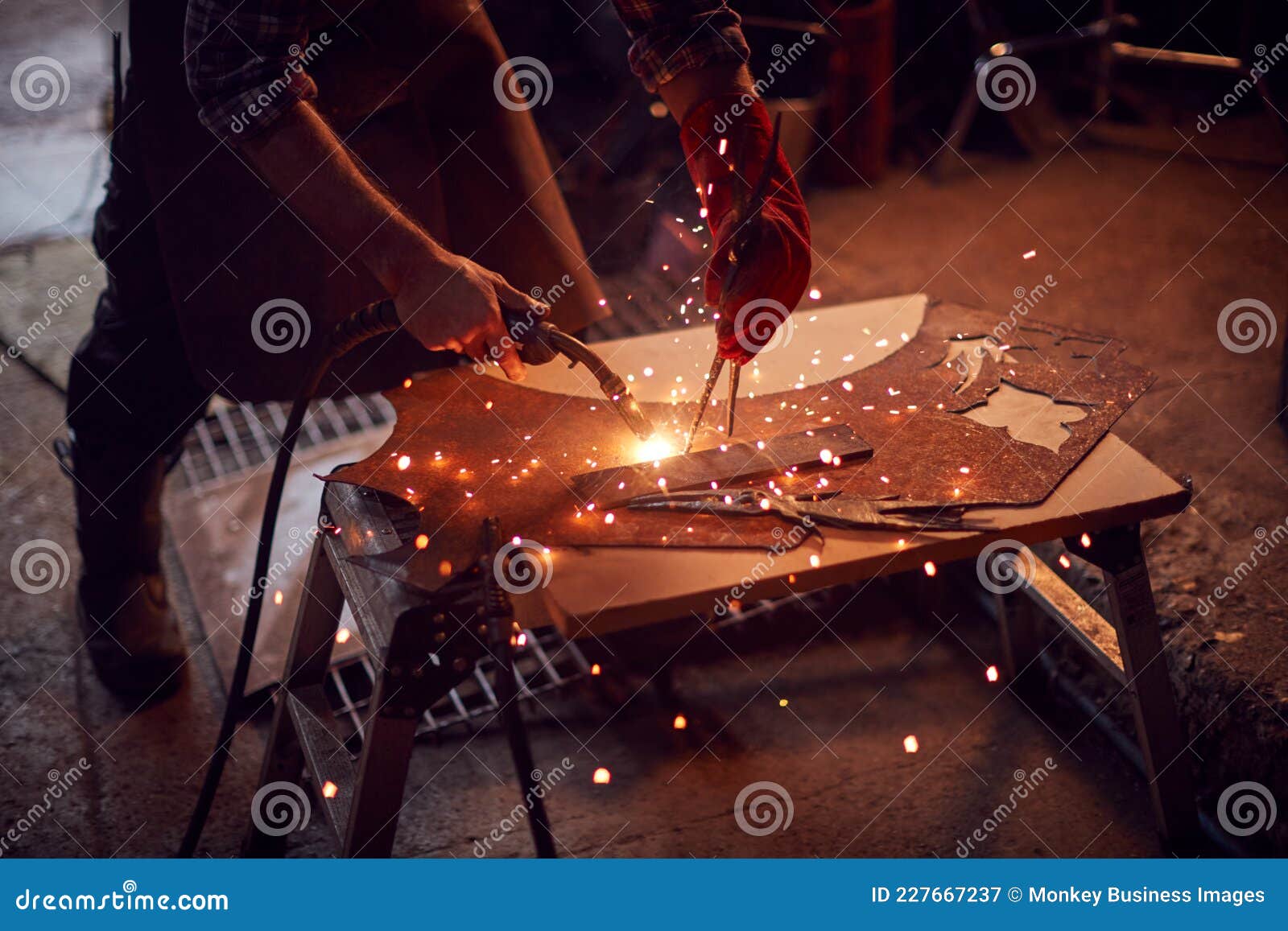 Close Up of Male Blacksmith Arc Welding Metalwork in Forge Stock Image ...