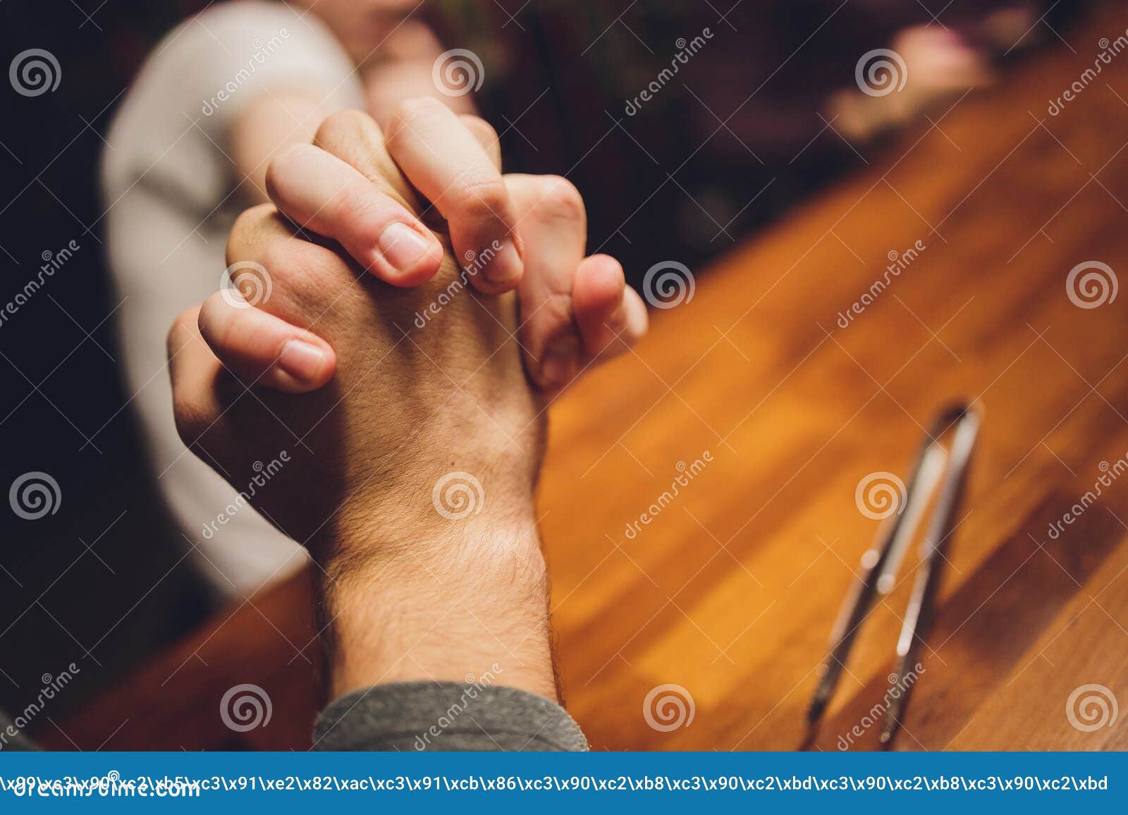 Close Up Male and Female Holding Hands Over Table. Stock Photo - Image ...