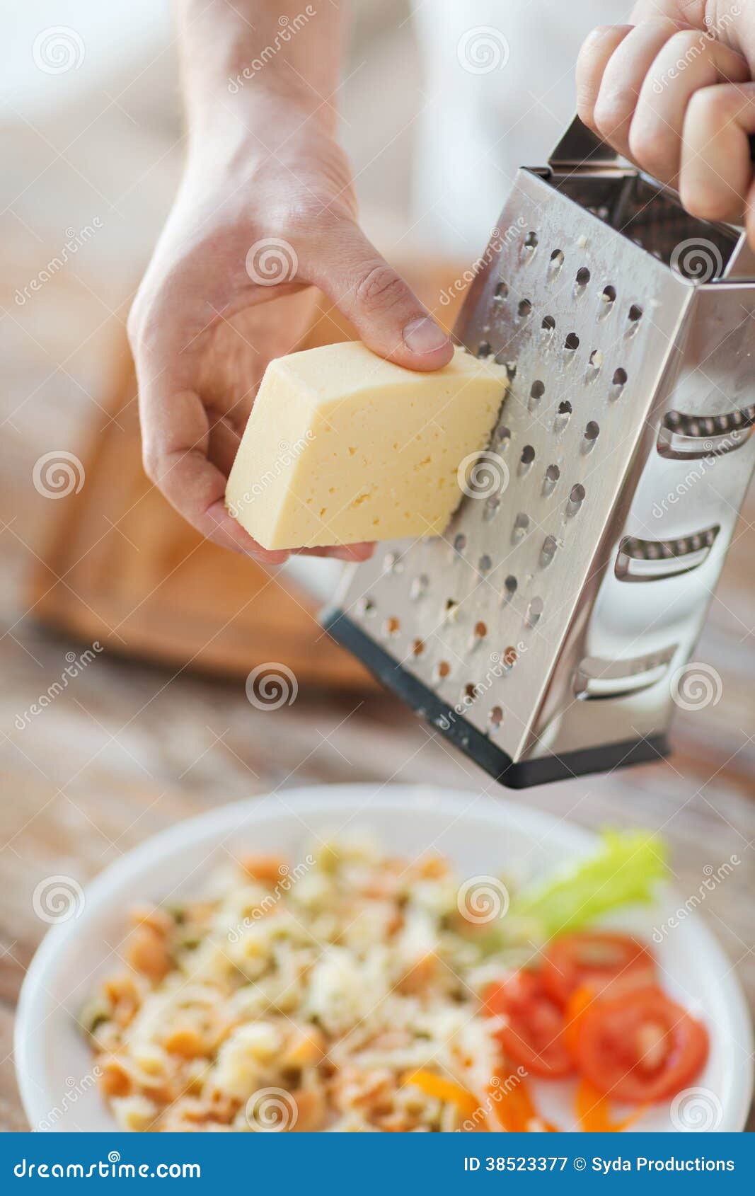 Close Up of Male Hands Grating Cheese Over Pasta Stock Image - Image of ...