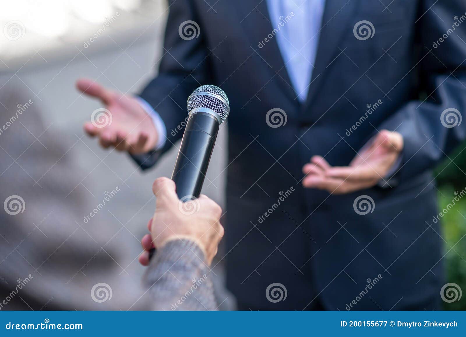 Close-up of Male Hands Holding Microphone during Interview Stock Image ...
