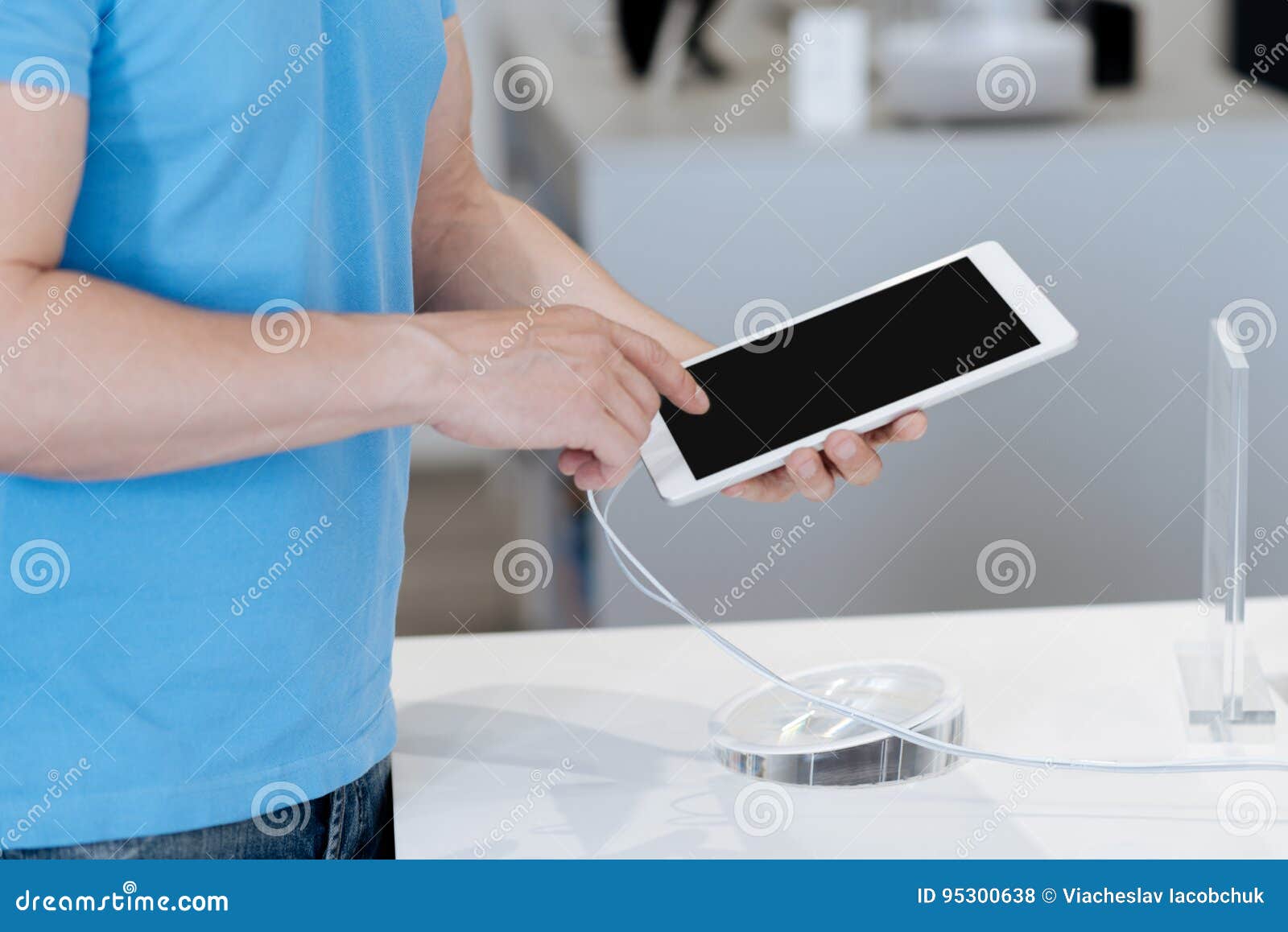 Close Up of Male Hands Testing Gadget at Electronics Store Stock Photo ...