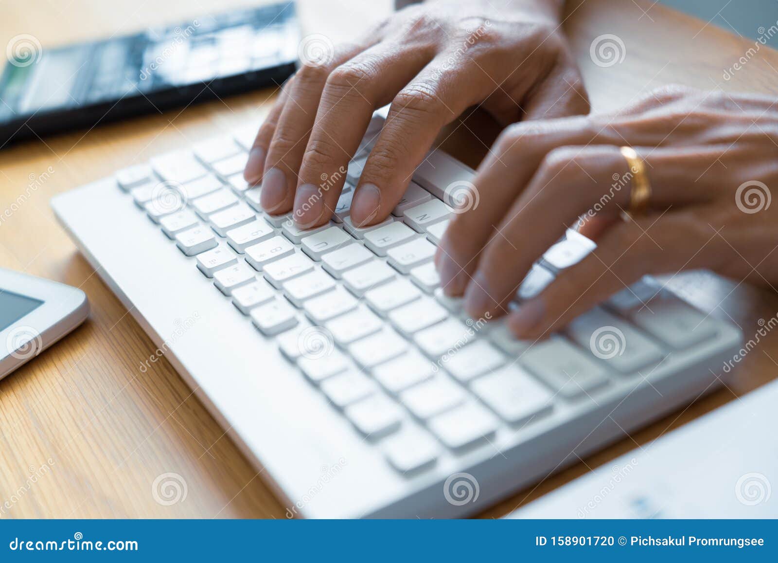 Close-up of Male Hands Typing on Keyboard Working on Compute Sitting ...
