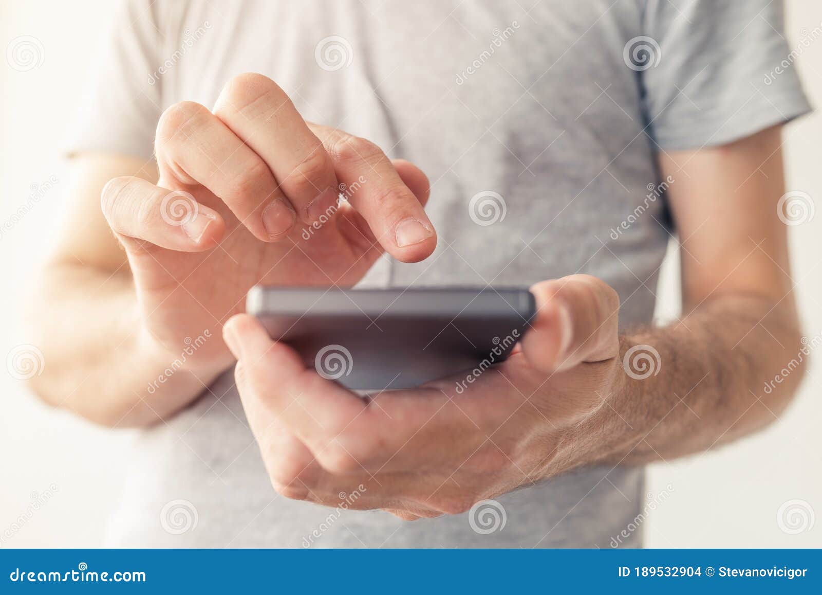 Close Up of Male Hands Typing Text Message on Smartphone Stock Photo ...