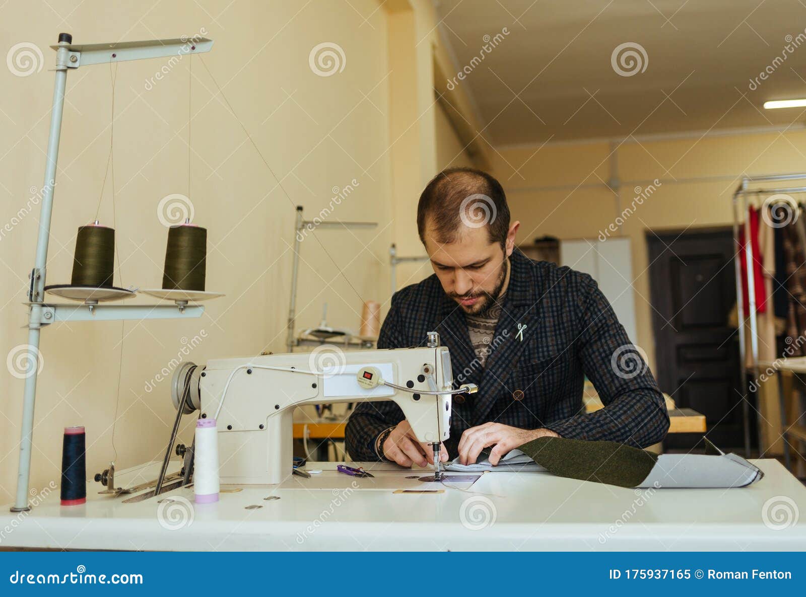 Close Up of a Male Shoemaker Working with Leather Textile at His ...