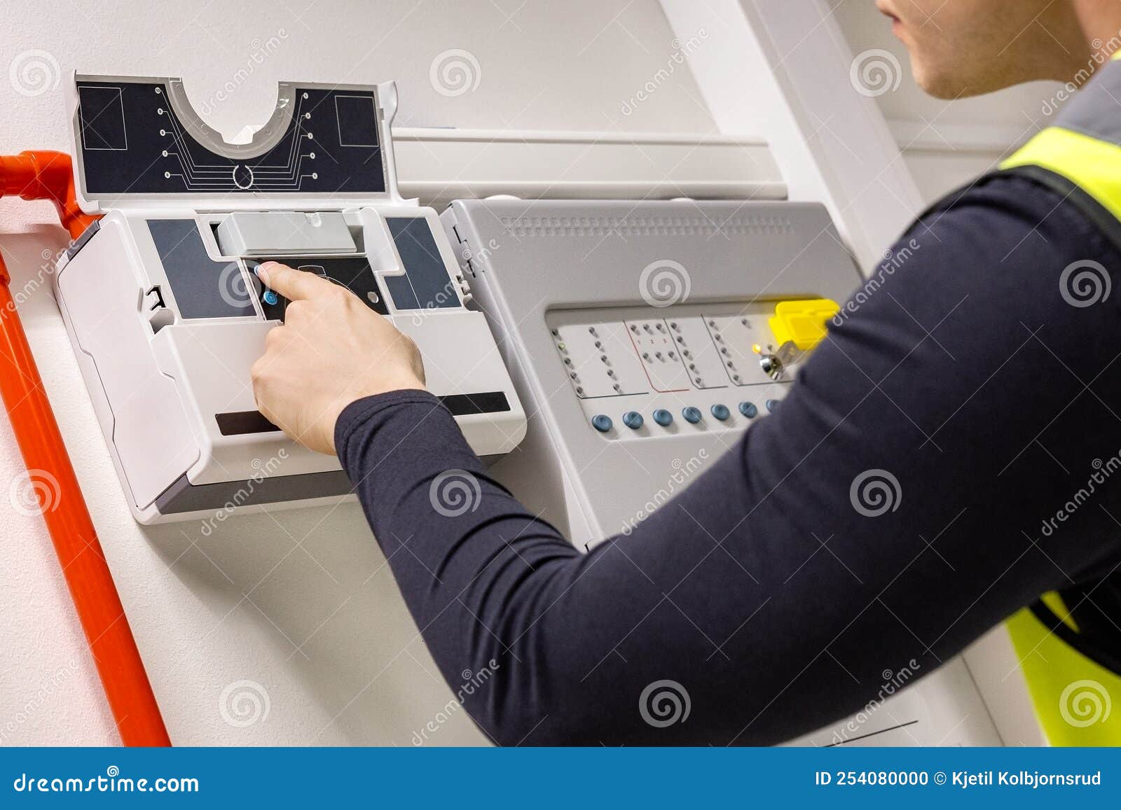 Close-up of Male Technician Checking Smoke Detector in Datacenter Stock ...