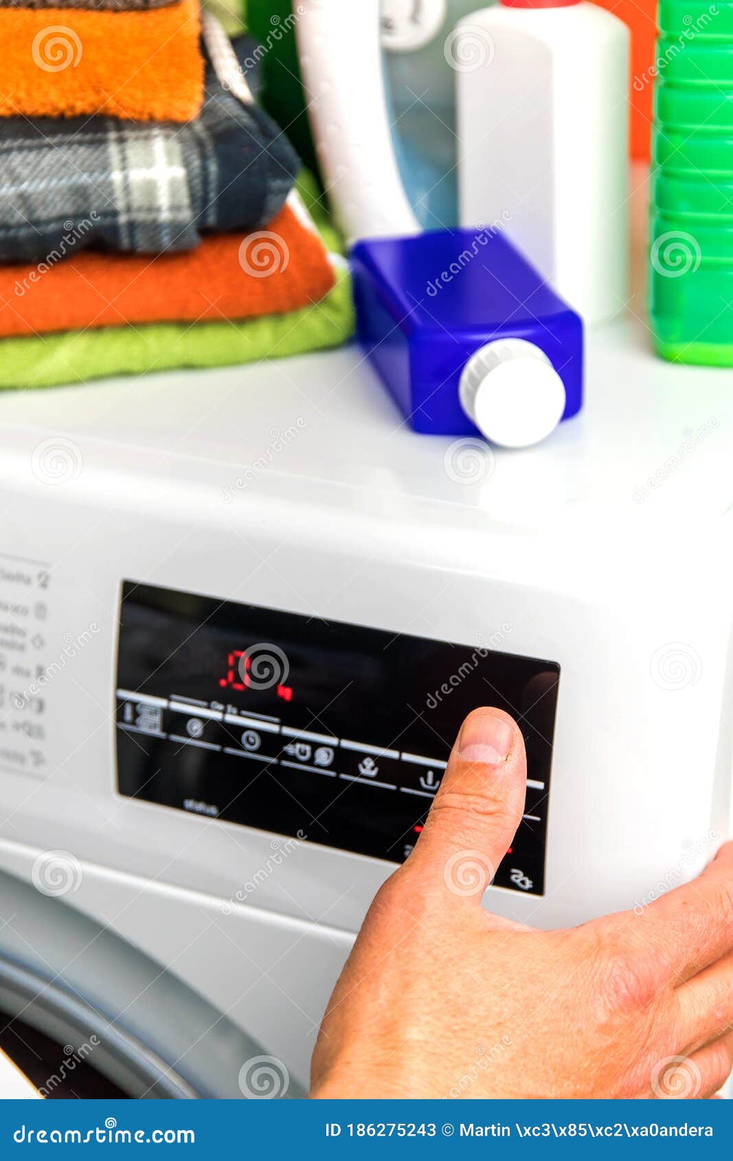 Close Up of Man Choosing Cycle Program on Washing Machine. Adjusting ...