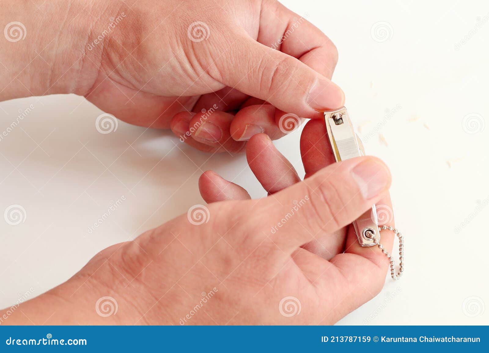 Close Up of Man Cutting Fingernails Using Nail Clipper Stock Image ...