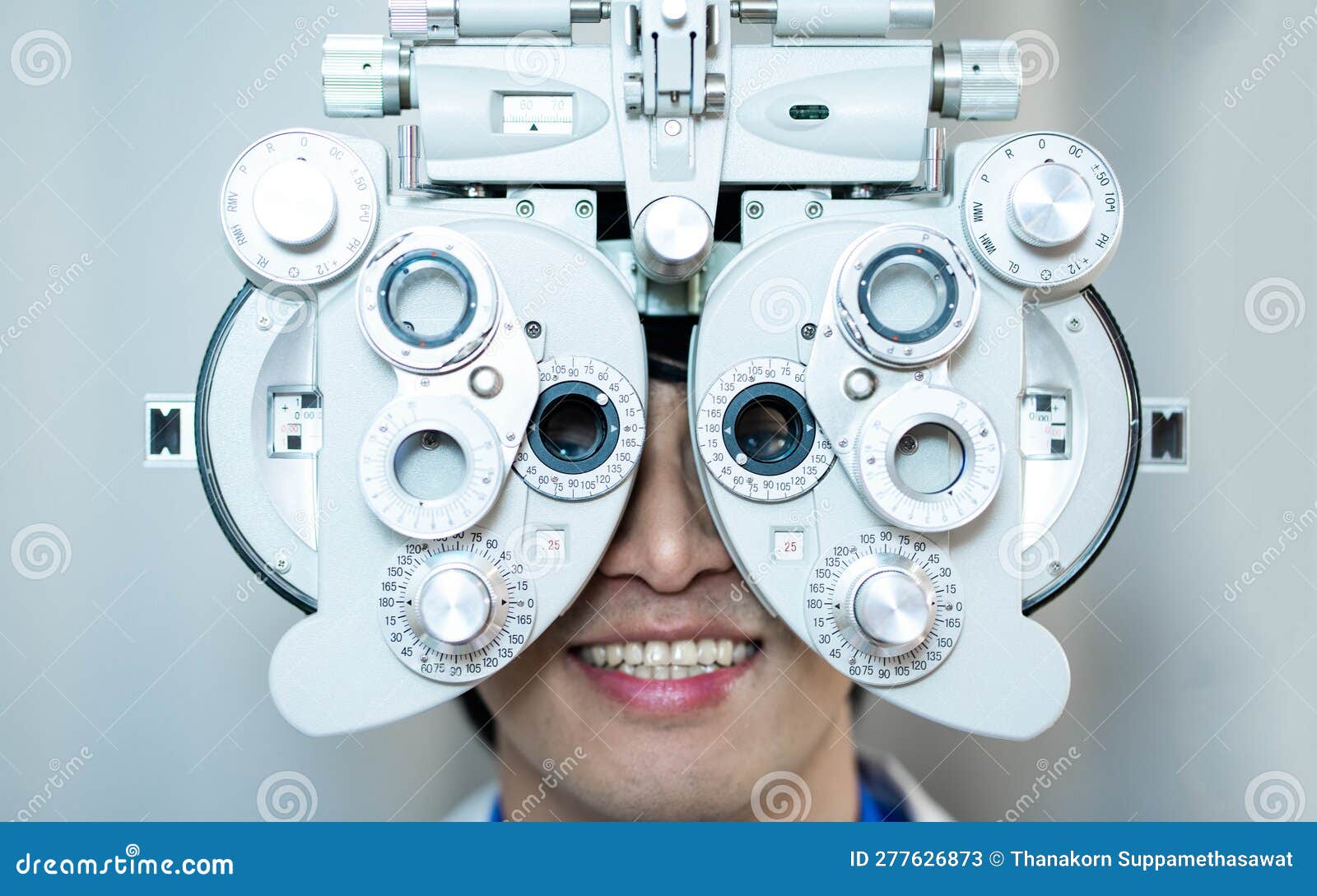 Close-up of a Man Doing Eye Test on Phoropter, Male Checking on Her Eye ...